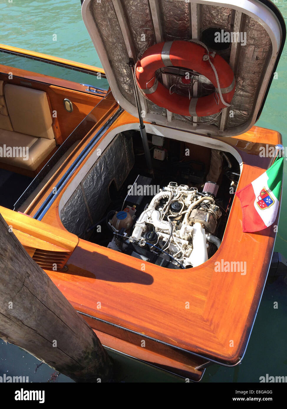 Maintenance of engine on Venetian water taxi, Venice Stock Photo - Alamy