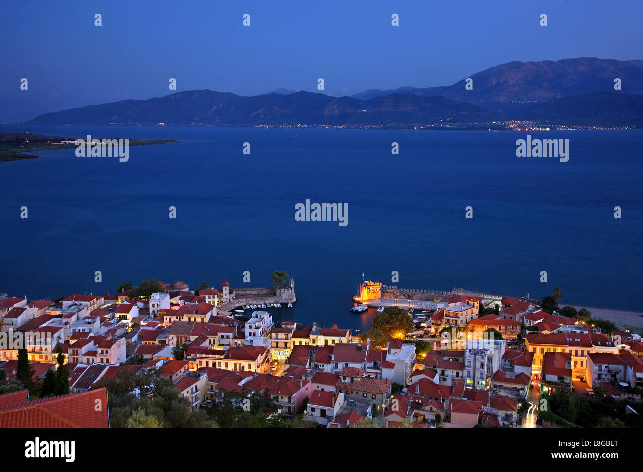 Night view of the picturesque little port of Nafpaktos (Lepanto) town ...