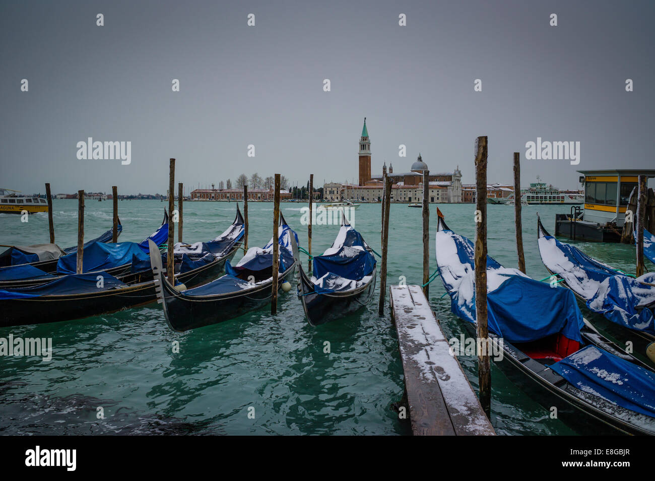 Winter in Venice, snow on gondolas, Grand Canal Stock Photo - Alamy