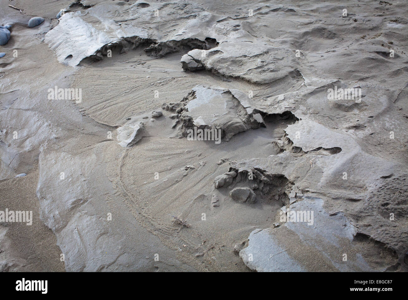 Interesting patterns in sand on a riverbed Stock Photo - Alamy