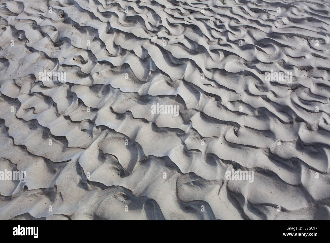 Interesting patterns in sand on a riverbed Stock Photo - Alamy
