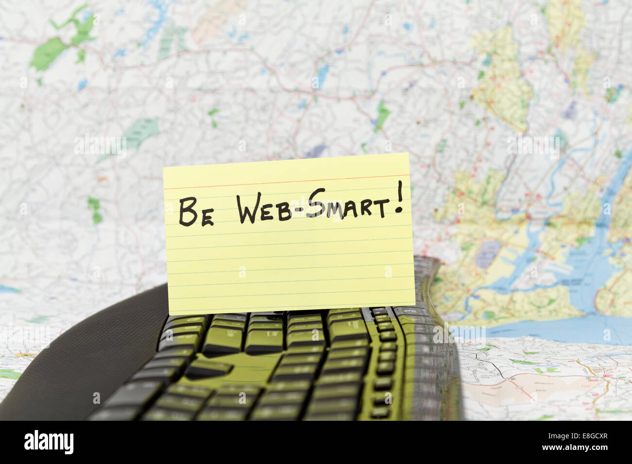 Be Web-Smart note written on yellow note card placed on black keyboard ...