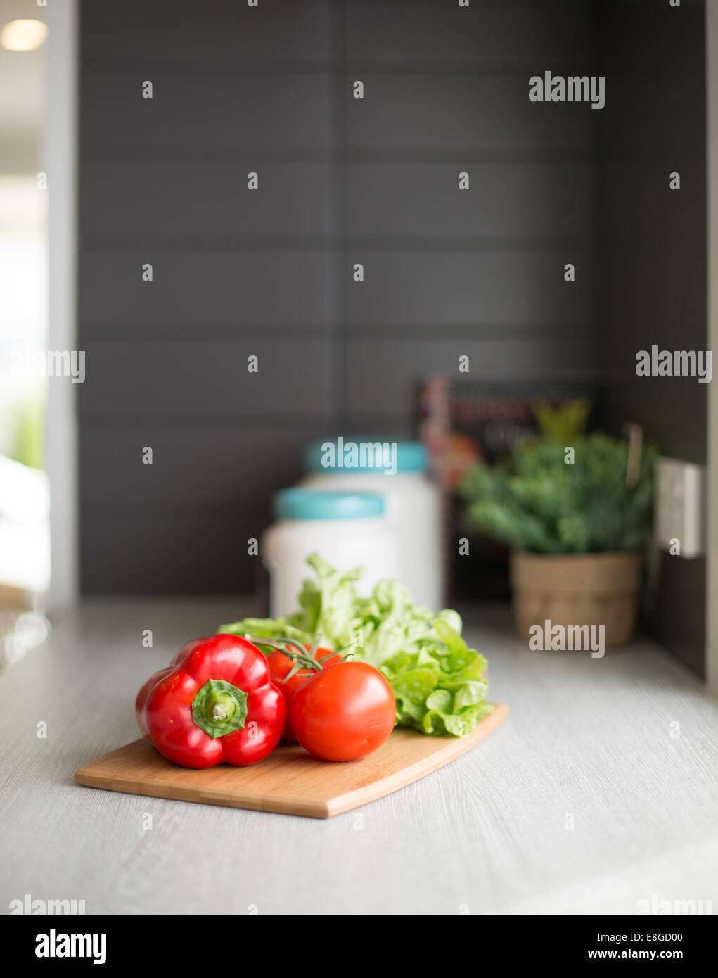 A modern kitchen with vegetables ready to be chopped Stock Photo - Alamy