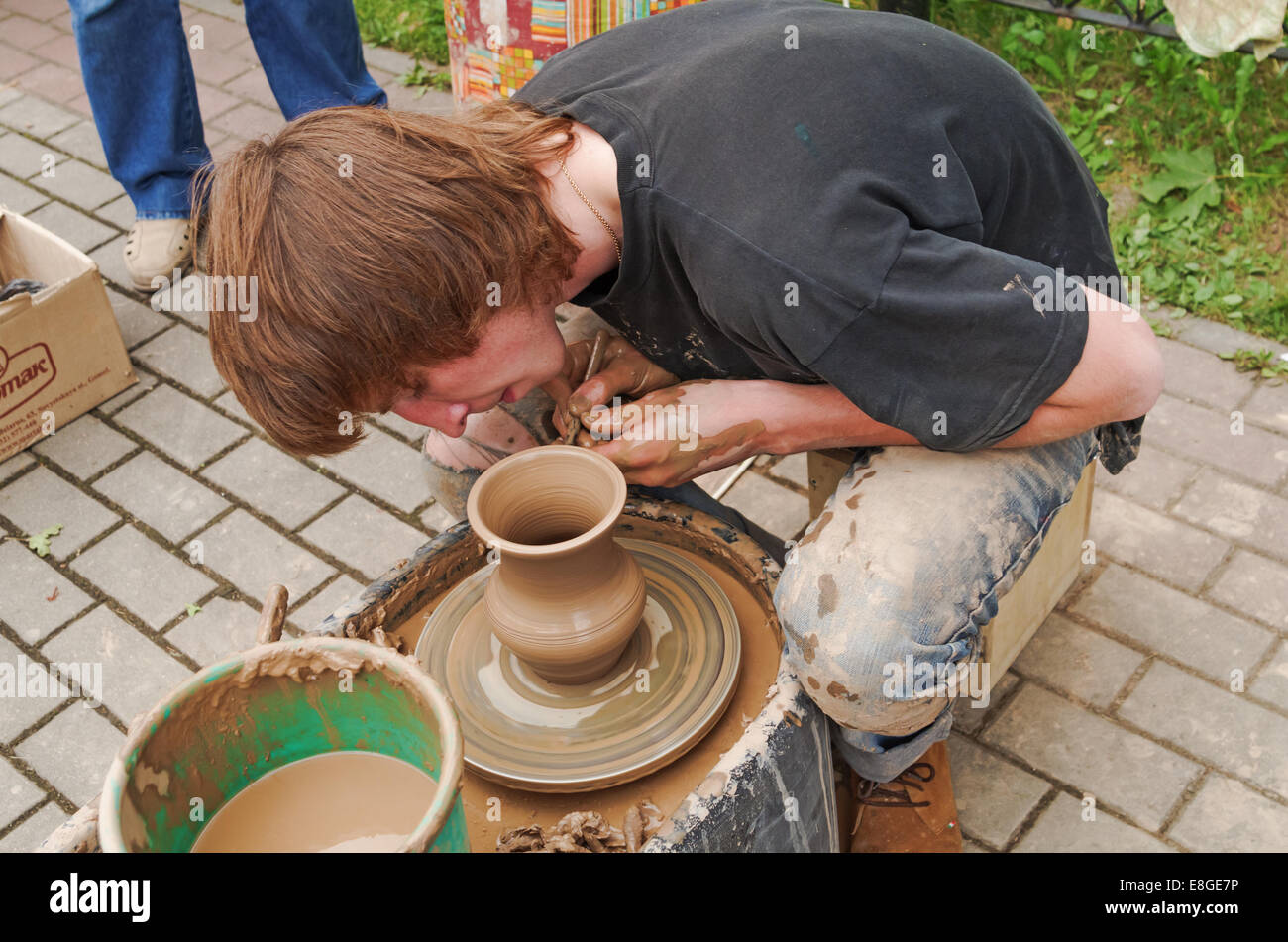 The student of Vitebsk State Pedagogical University does a clay jug ...