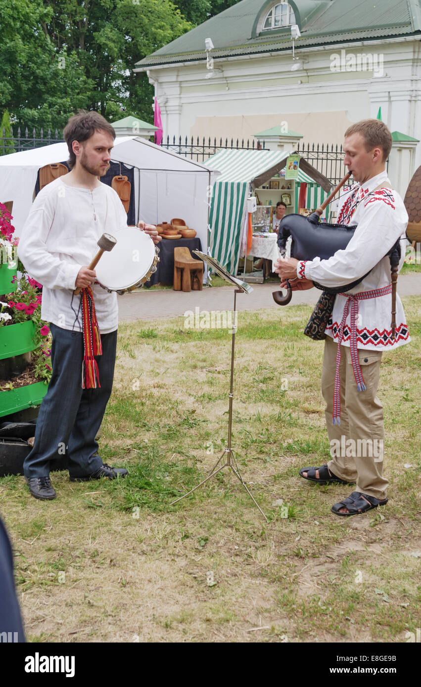 The Belarus folklore groups dance and sings on streets in Vitebsk.The ...