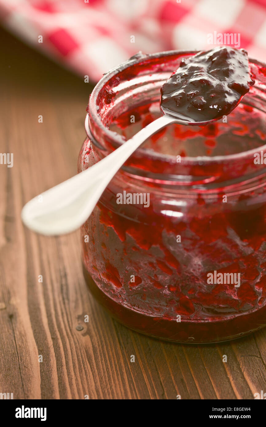 the fruity jam in spoon Stock Photo - Alamy