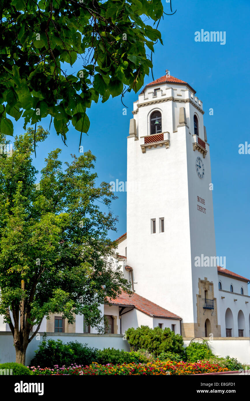 Train Depot building with trees and garden Stock Photo - Alamy