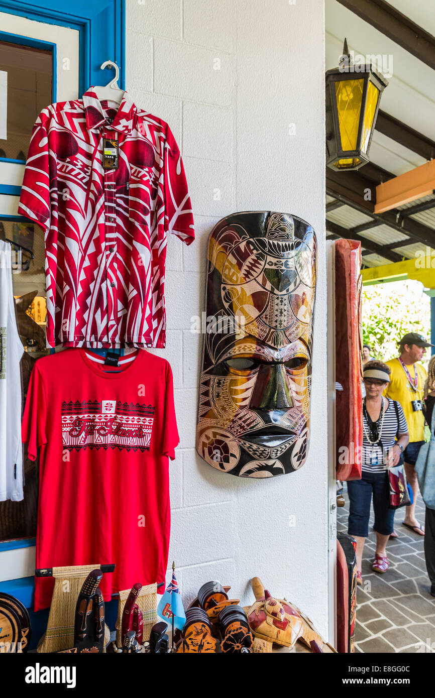 Traditional goods and carvings on display in shop at Fiji Stock Photo ...