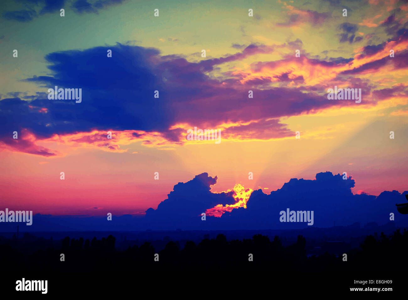 wonderful sunset with dark blue clouds, evening sky Stock Photo - Alamy