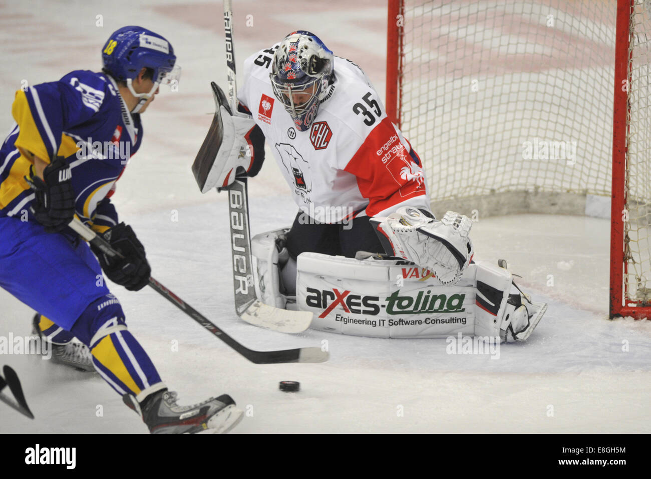 From left: Roman Vlach of Zlin and the goalkeeper of Berlin Mathias ...