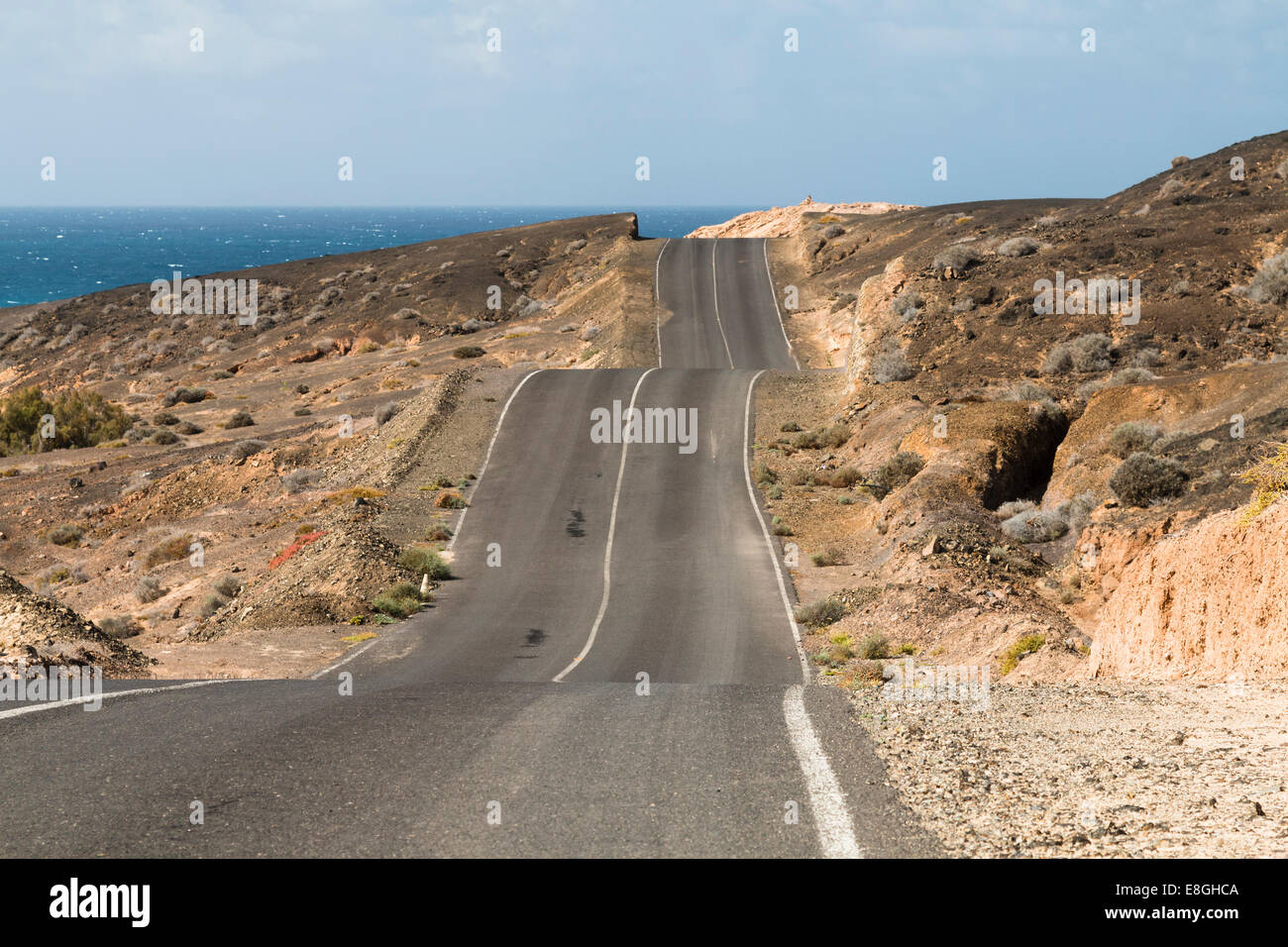 A wavy road in Fuerteventura, Spain Stock Photo - Alamy
