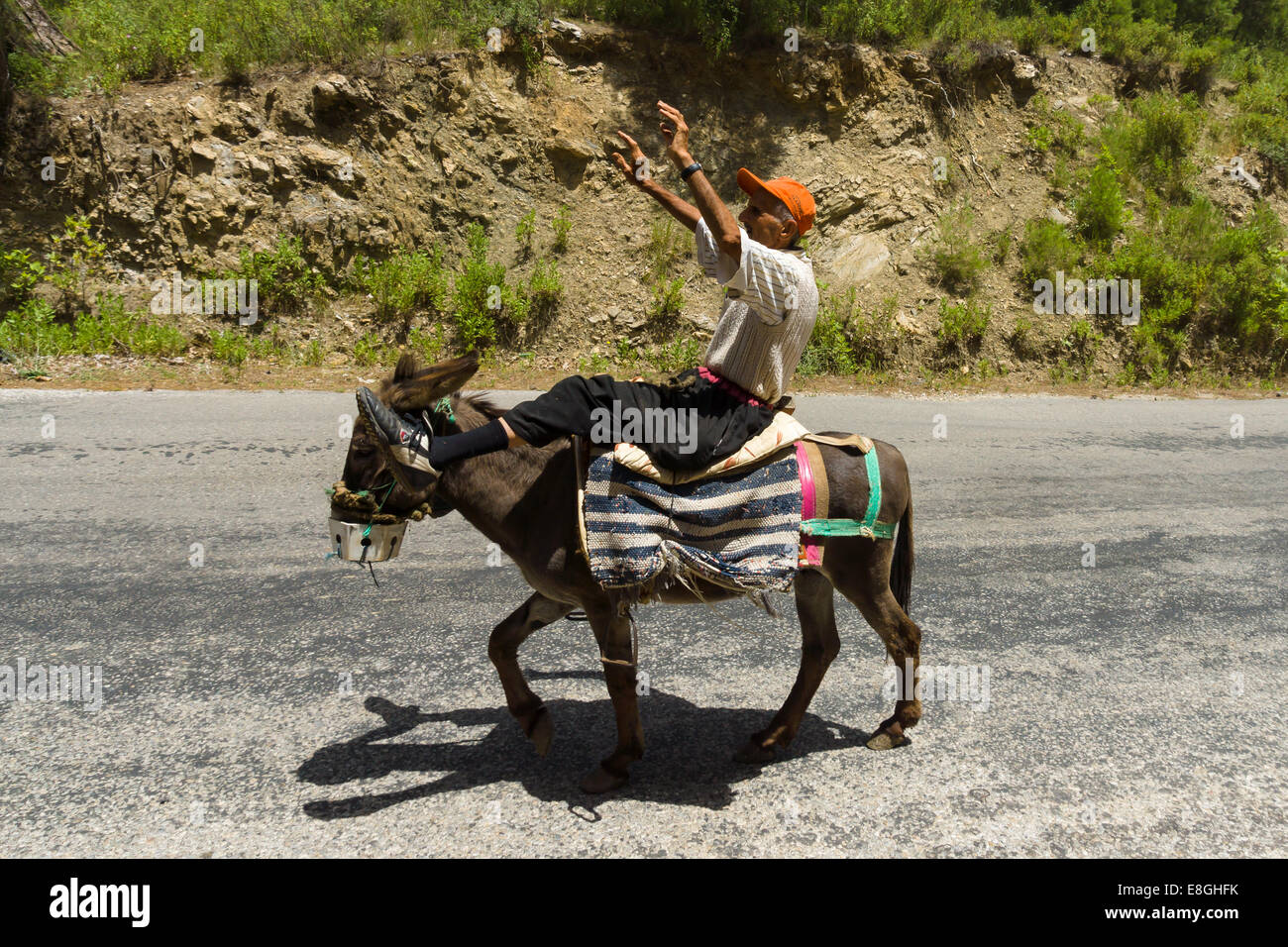 Man riding donkey hi-res stock photography and images - Alamy