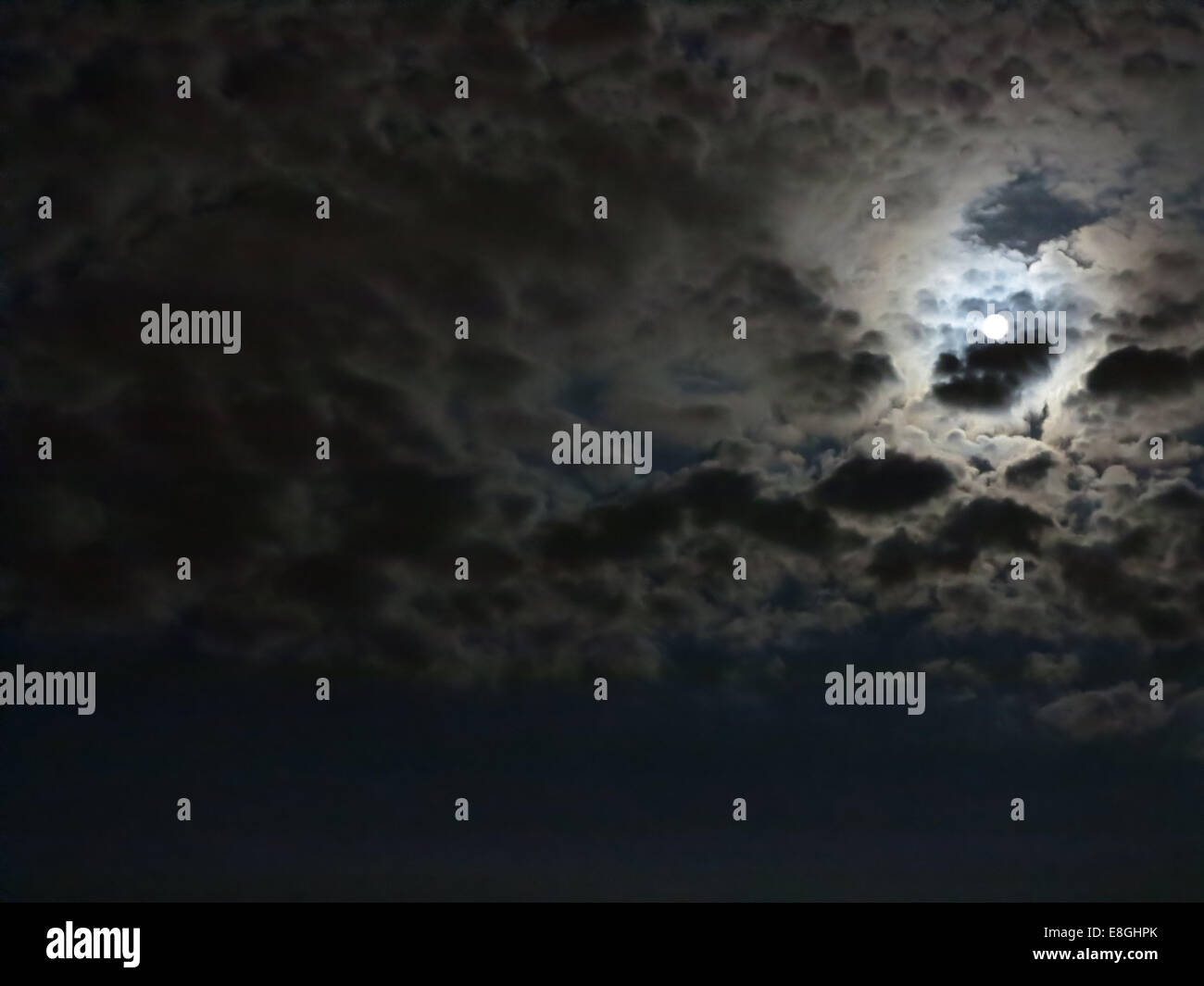 Cloudy night moon in sky hi-res stock photography and images - Alamy
