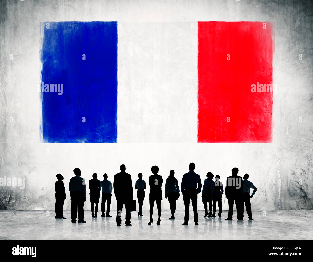 French flag and a group of business people Stock Photo - Alamy
