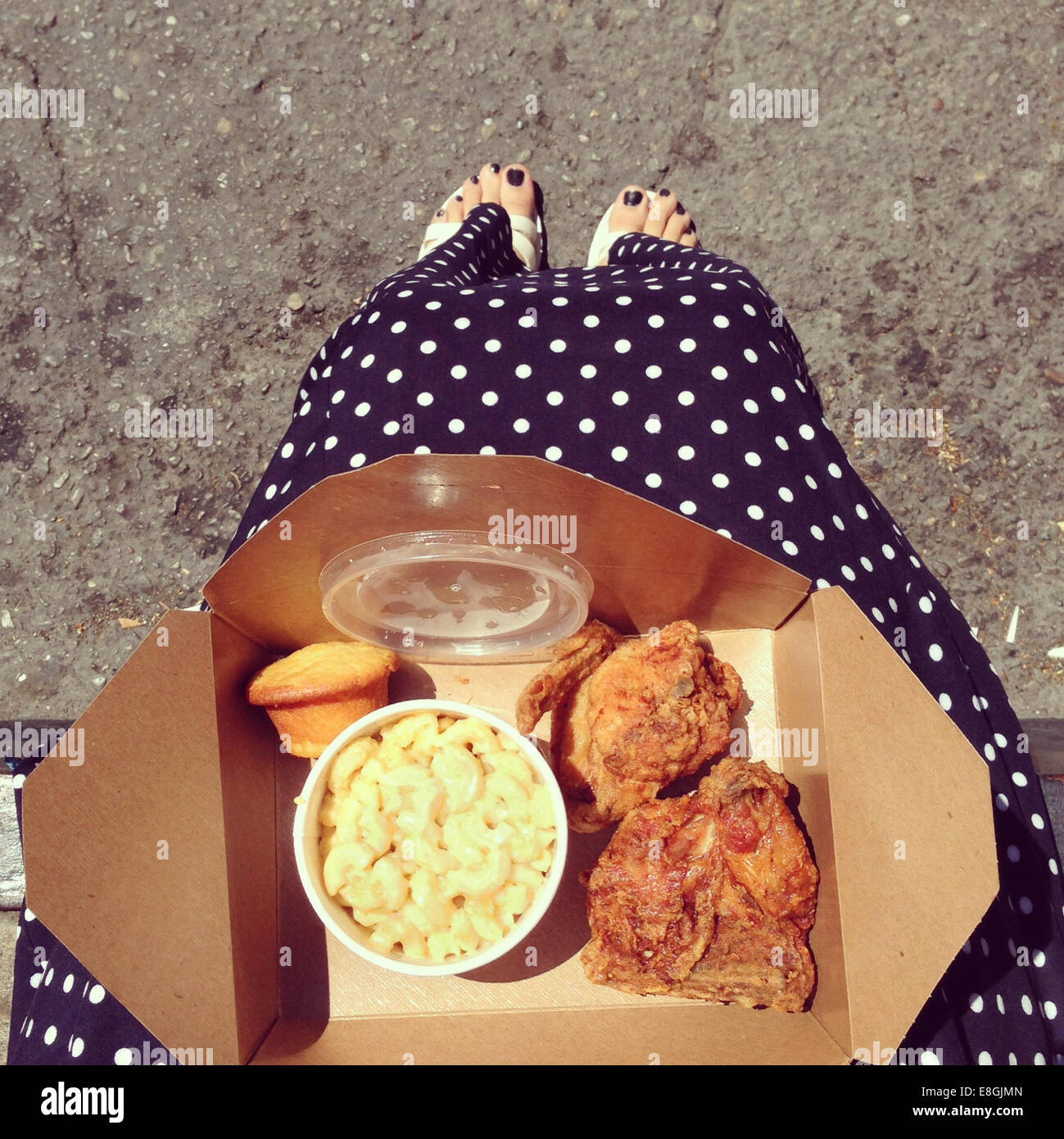 Woman with a Fried chicken take away Stock Photo - Alamy