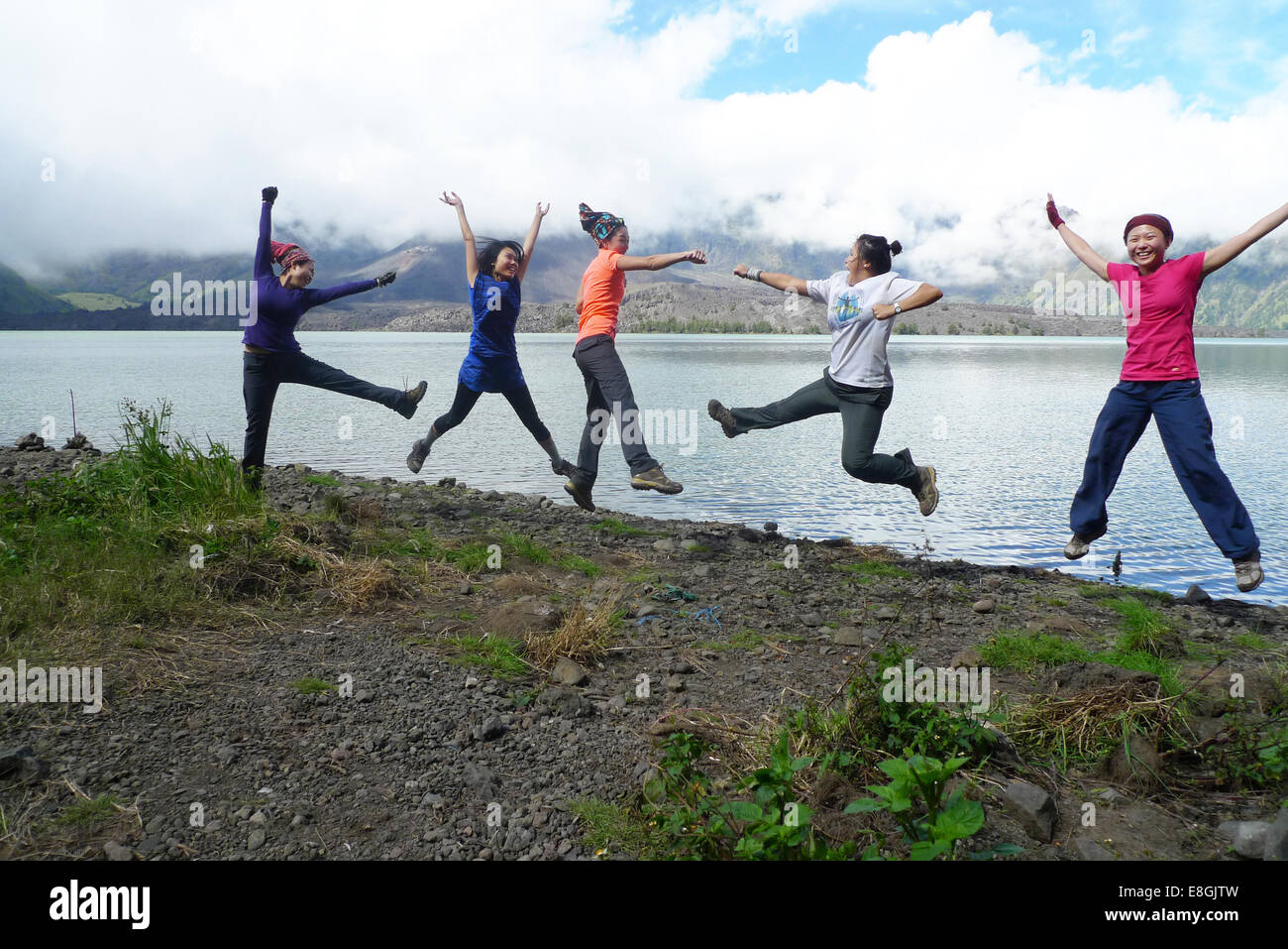 Five people jumping hi-res stock photography and images - Alamy