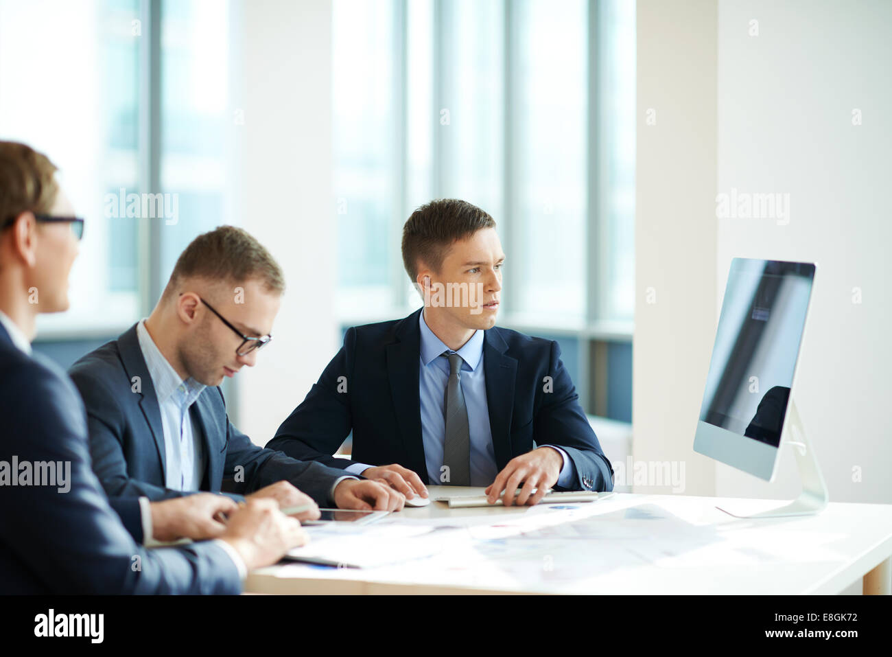 Three male office workers hi-res stock photography and images - Alamy