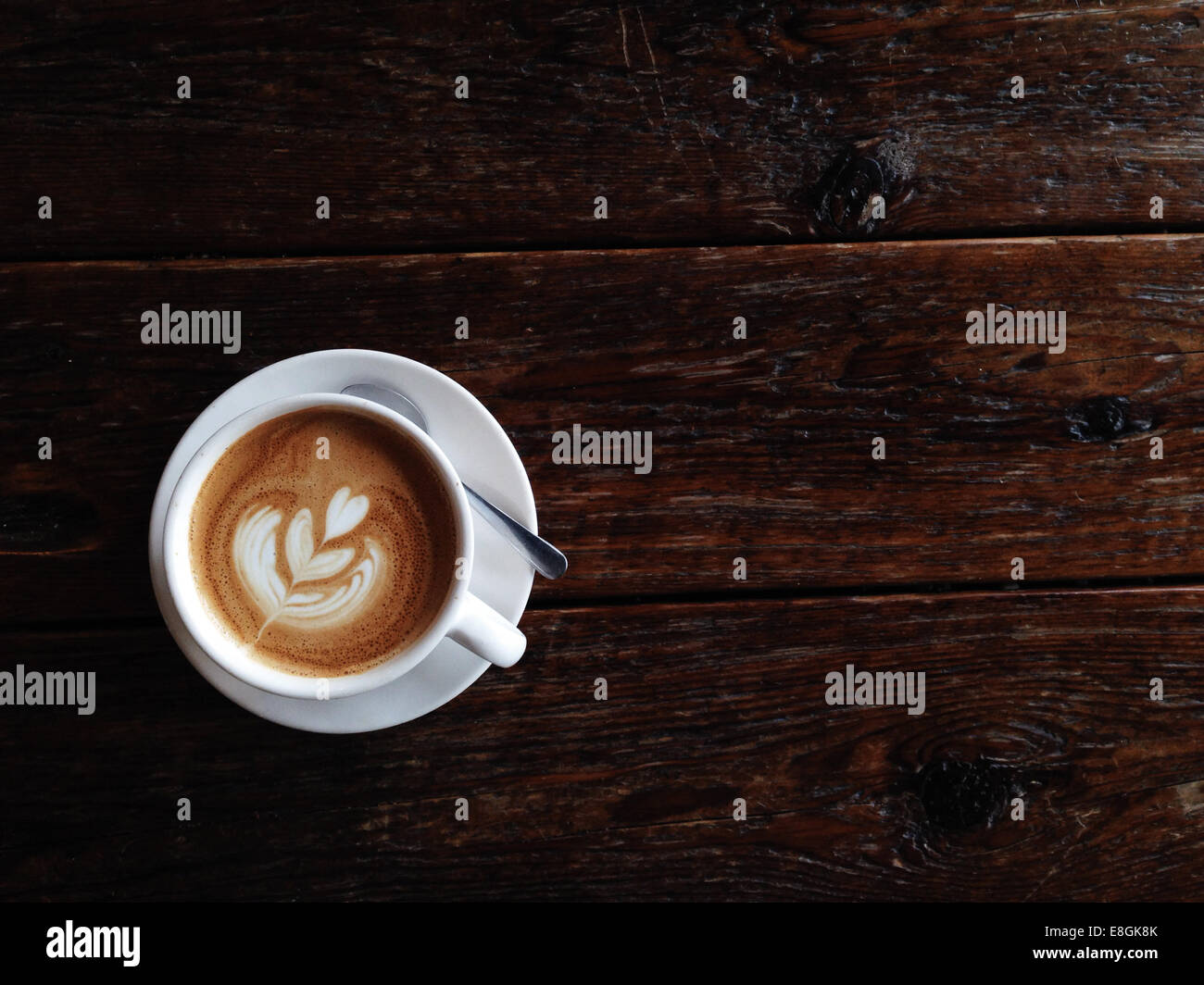 Overhead view of a latte coffee Stock Photo - Alamy