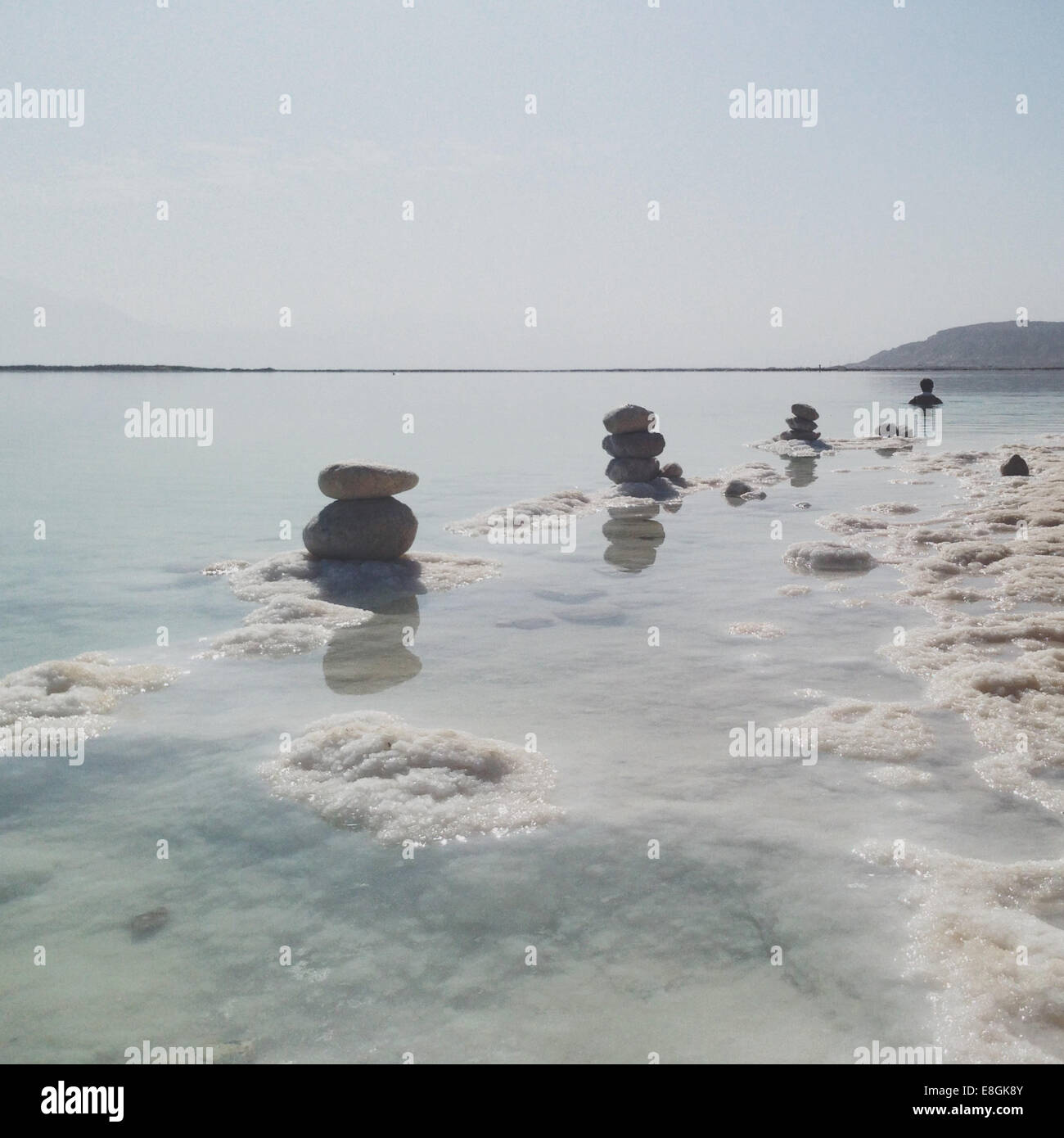 Israel, Dead Sea, Pebbles stacked in sea Stock Photo - Alamy
