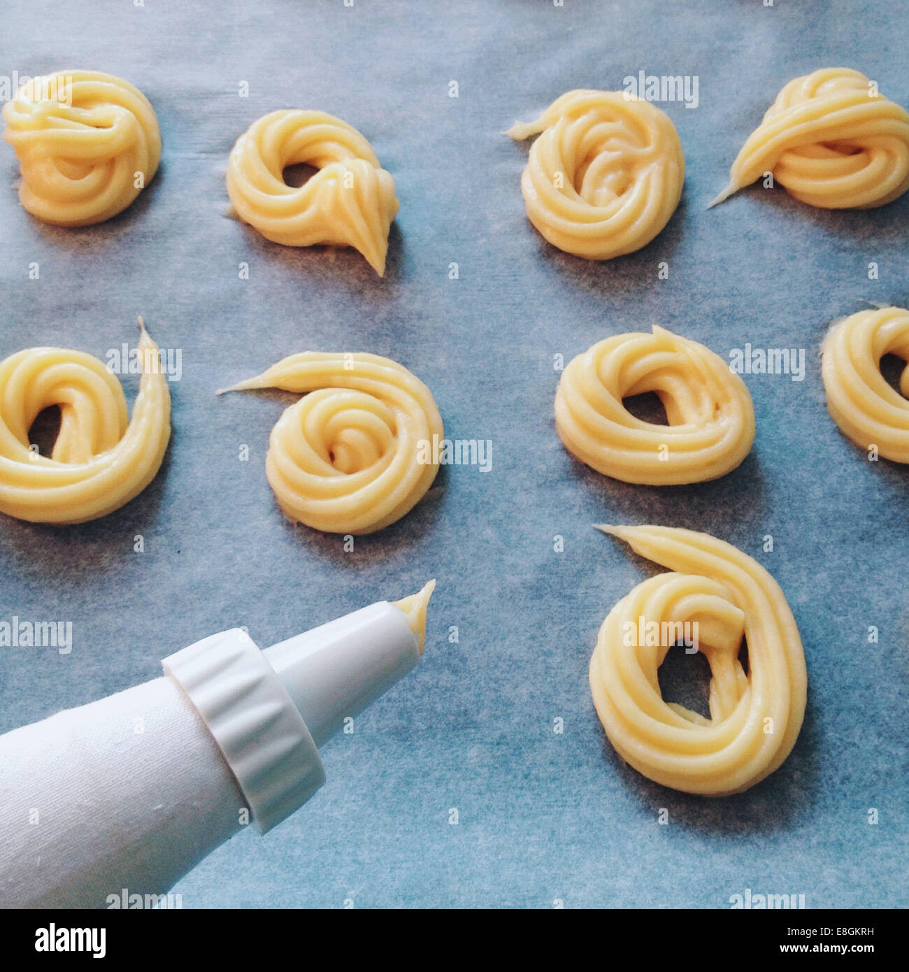 Raw choux pastry dough on greaseproof paper Stock Photo - Alamy