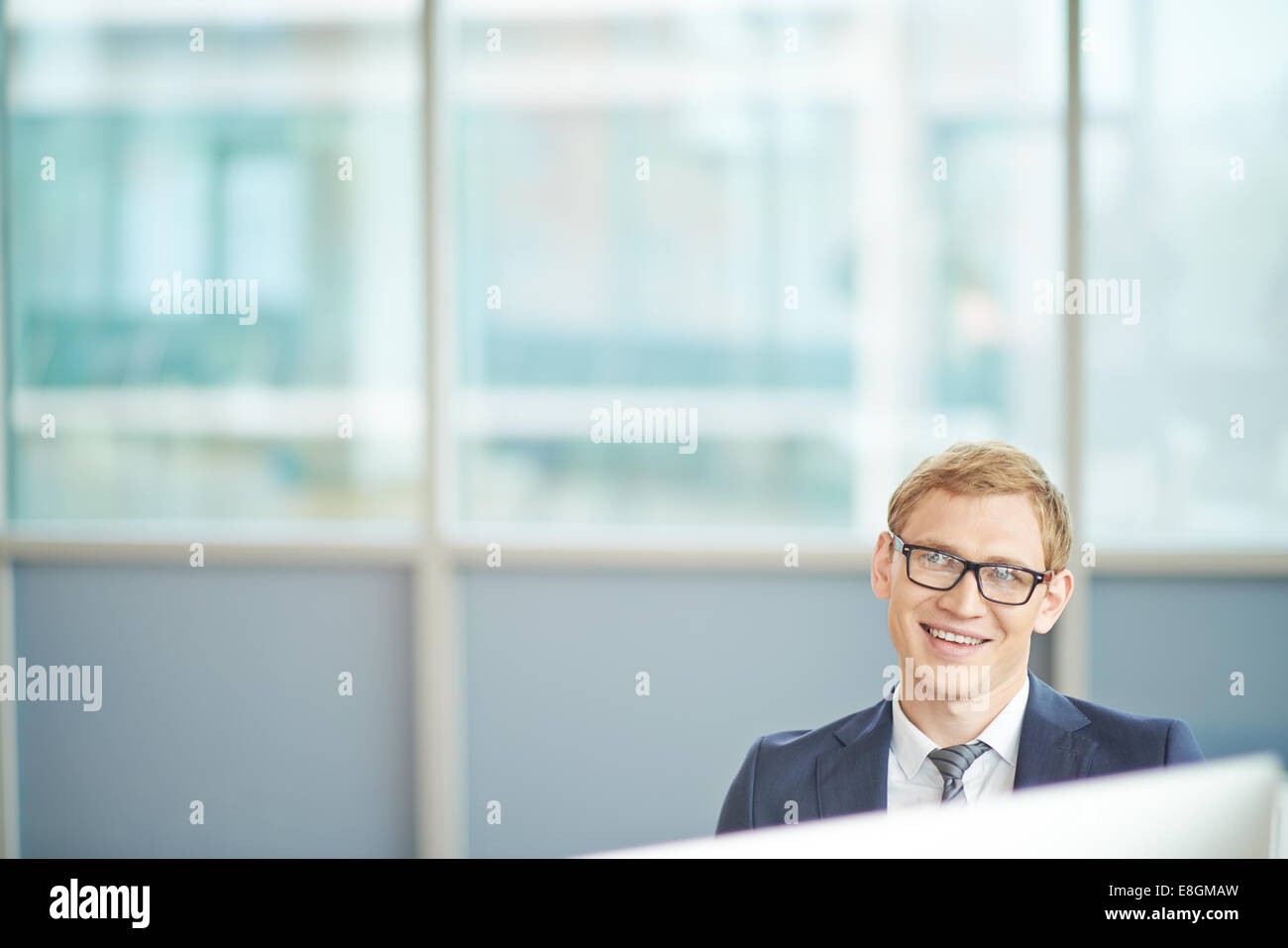 Three colleagues talking in office Stock Photo - Alamy