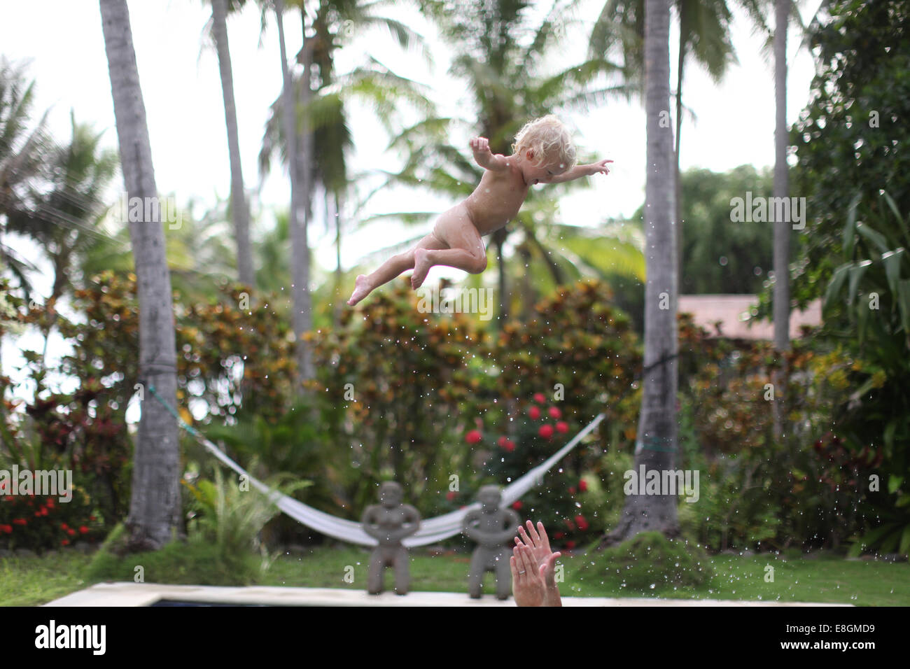 Baby thrown in air hi-res stock photography and images - Alamy