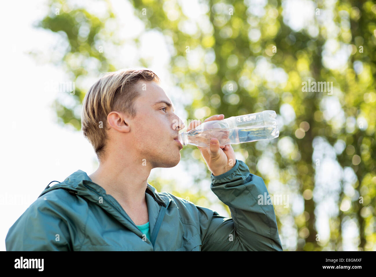 Young man holding sip hi-res stock photography and images - Alamy