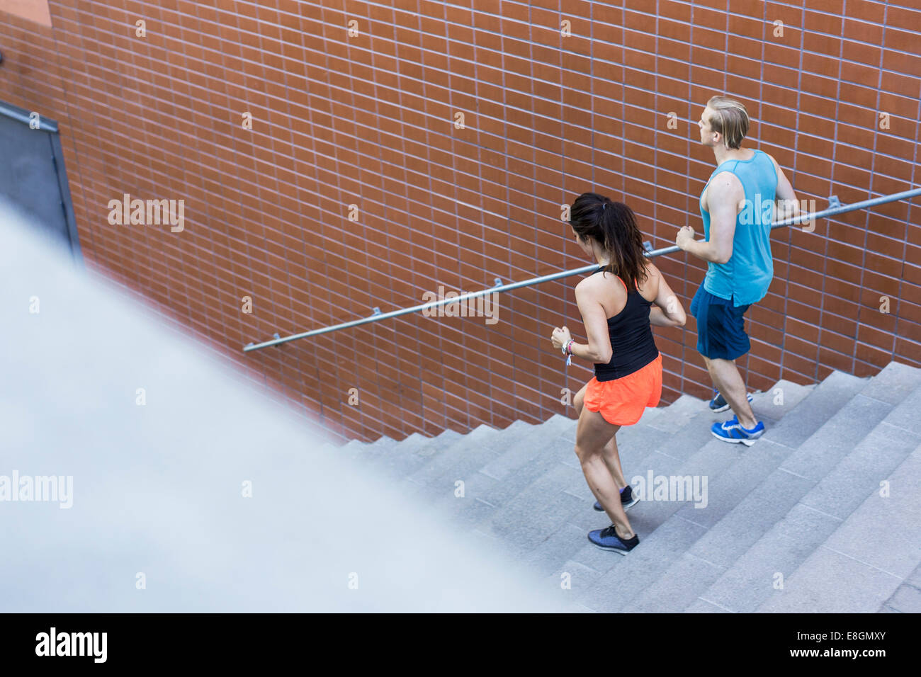 Running down steps hi-res stock photography and images - Alamy