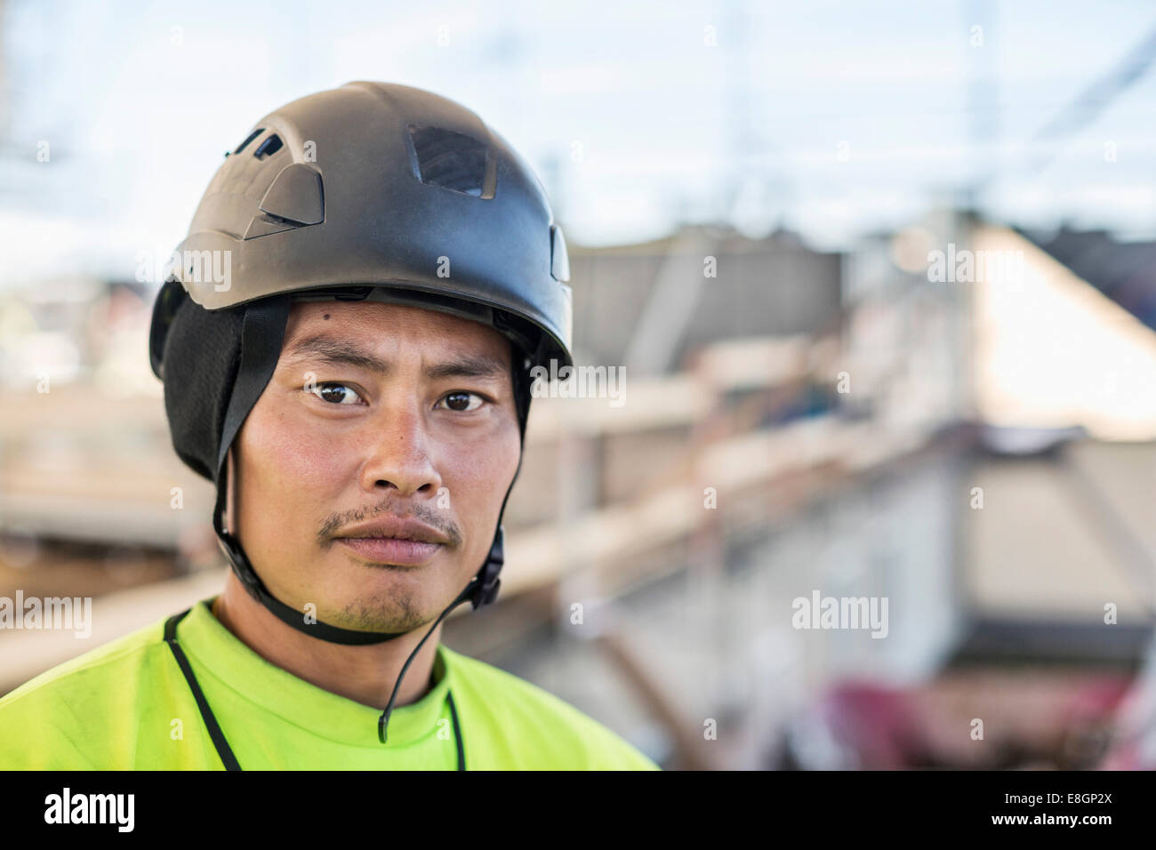 Portrait of confident construction worker at site Stock Photo - Alamy