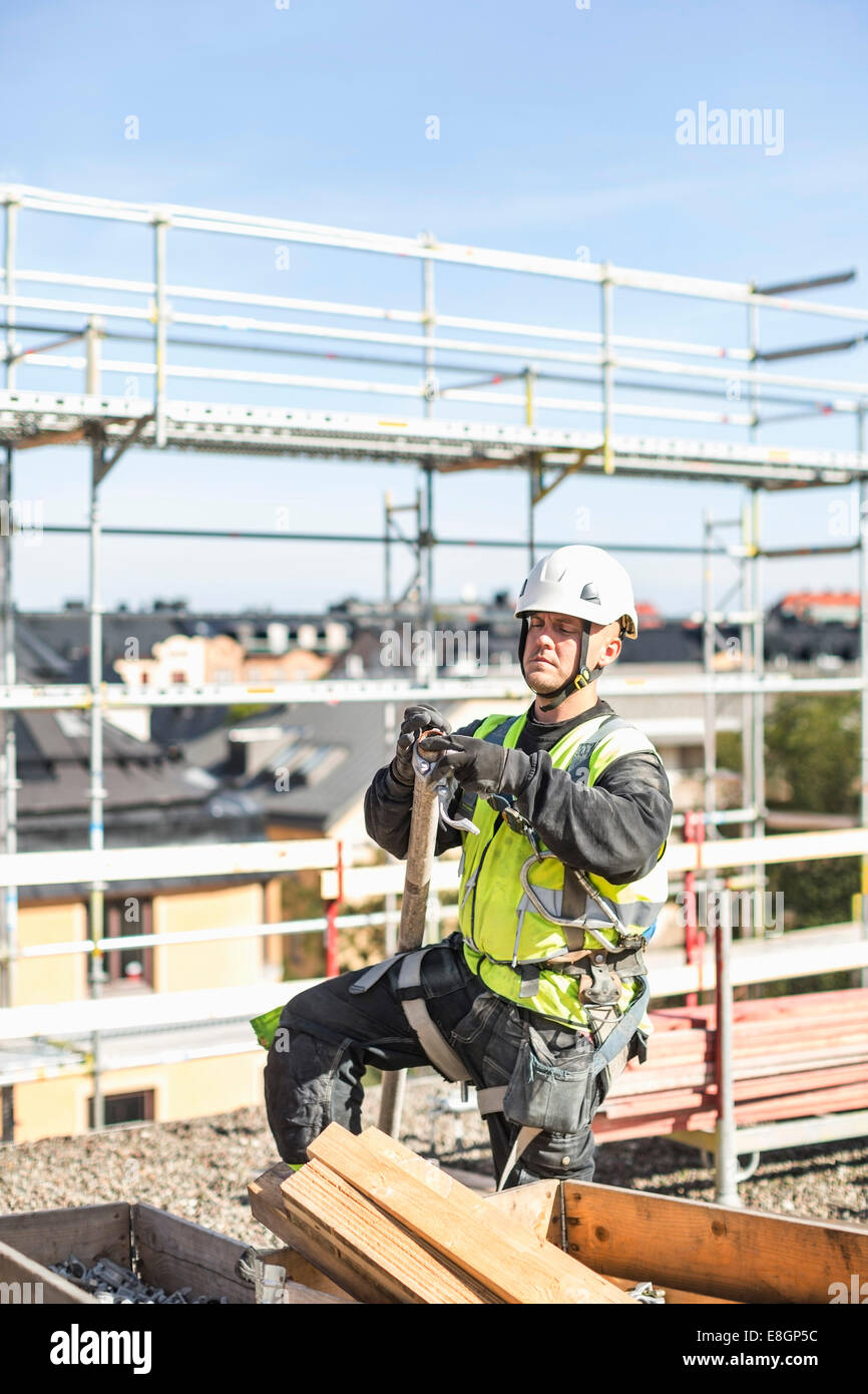 Construction worker working at site Stock Photo - Alamy