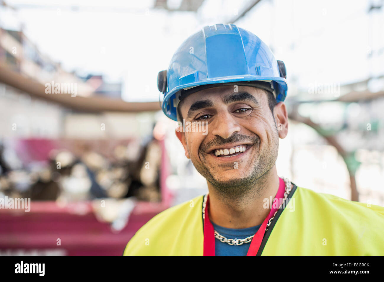 Portrait of happy construction worker at site Stock Photo - Alamy