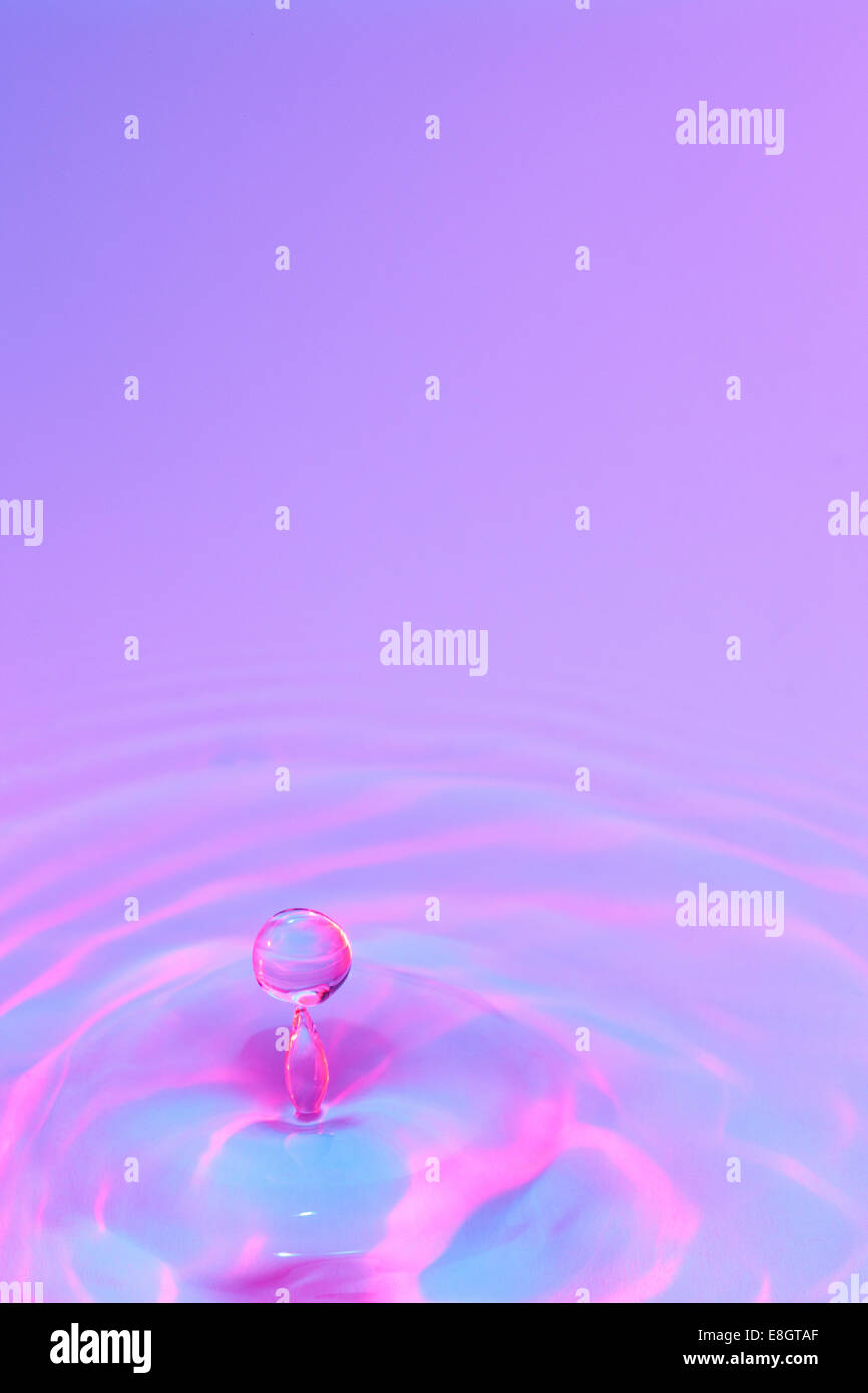 Purple Water Splash High Resolution Stock Photography and Images - Alamy