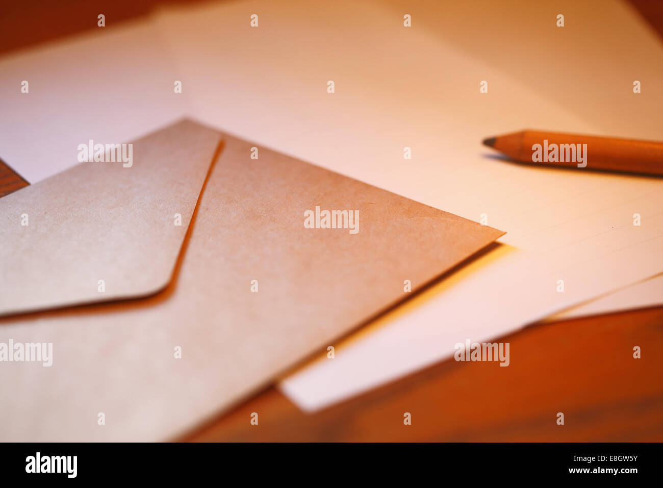Letters And Pencil On Wooden Table Stock Photo - Alamy