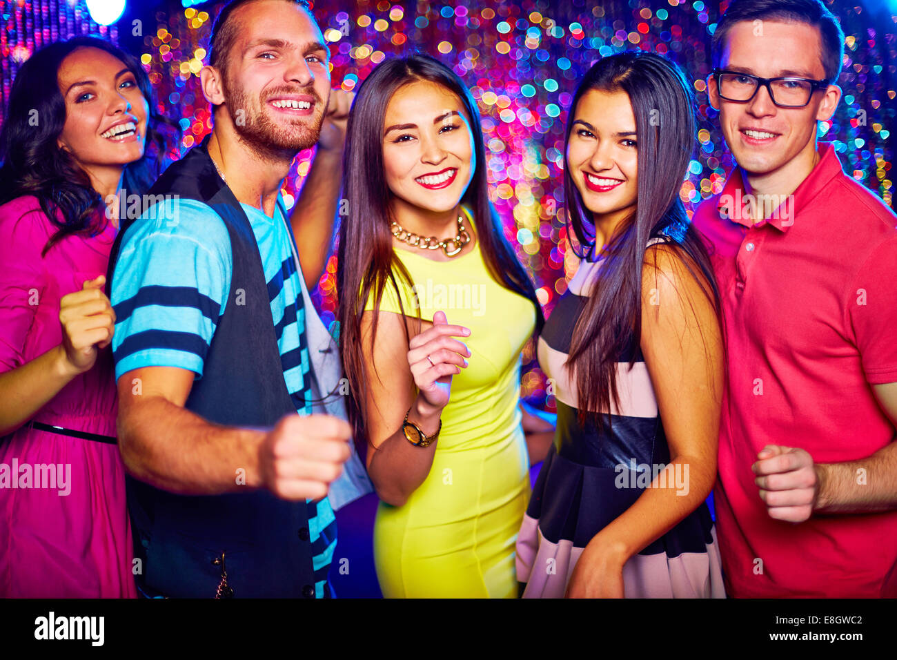 Portrait of five friends dancing at disco party Stock Photo - Alamy