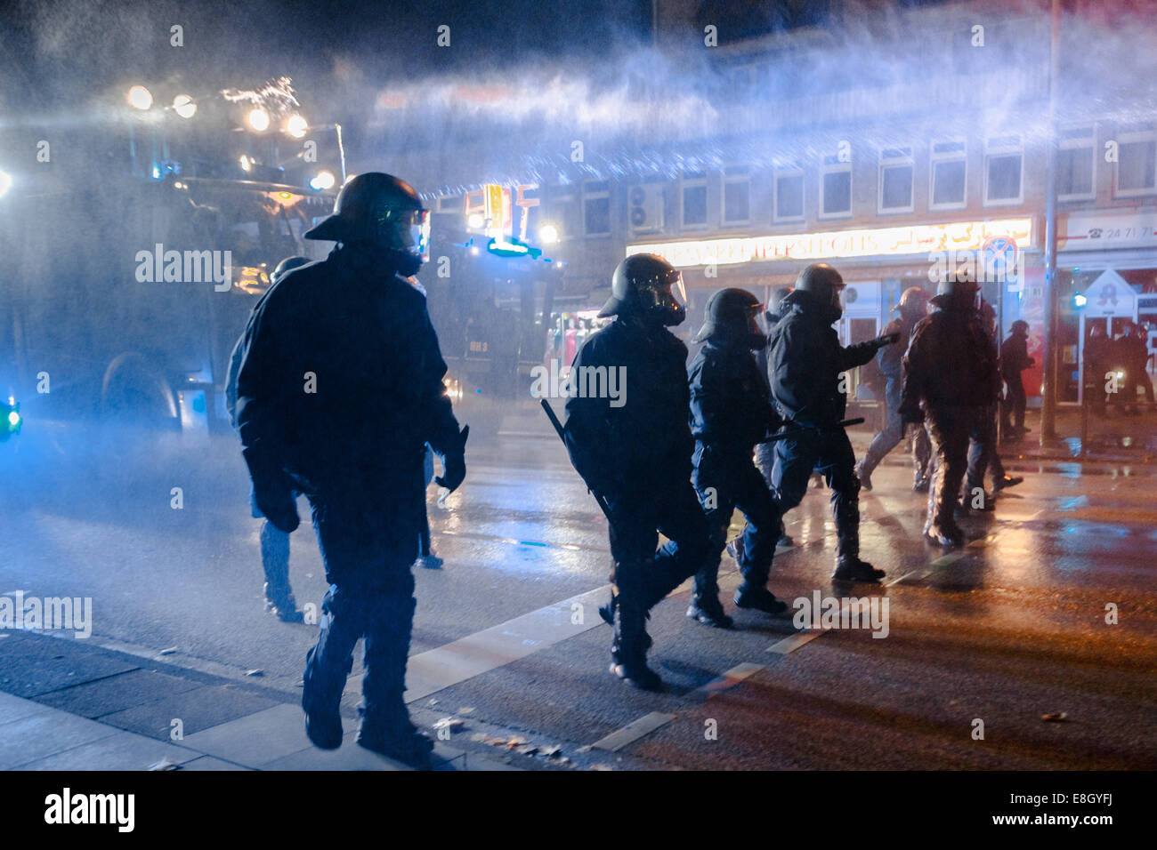 Hamburg, Germany. 8th October, 2014. Police break up a demonstration of ...