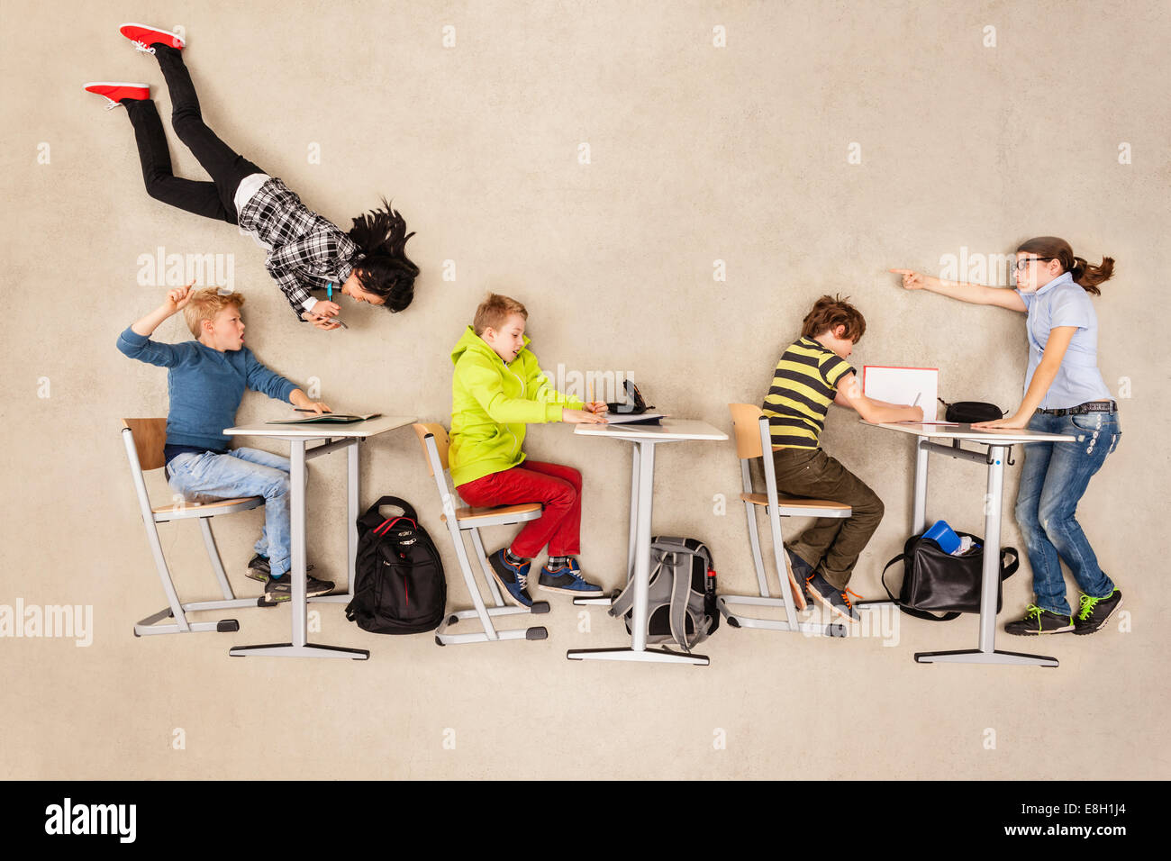 School test, teacher scolding pupil copying off Stock Photo - Alamy