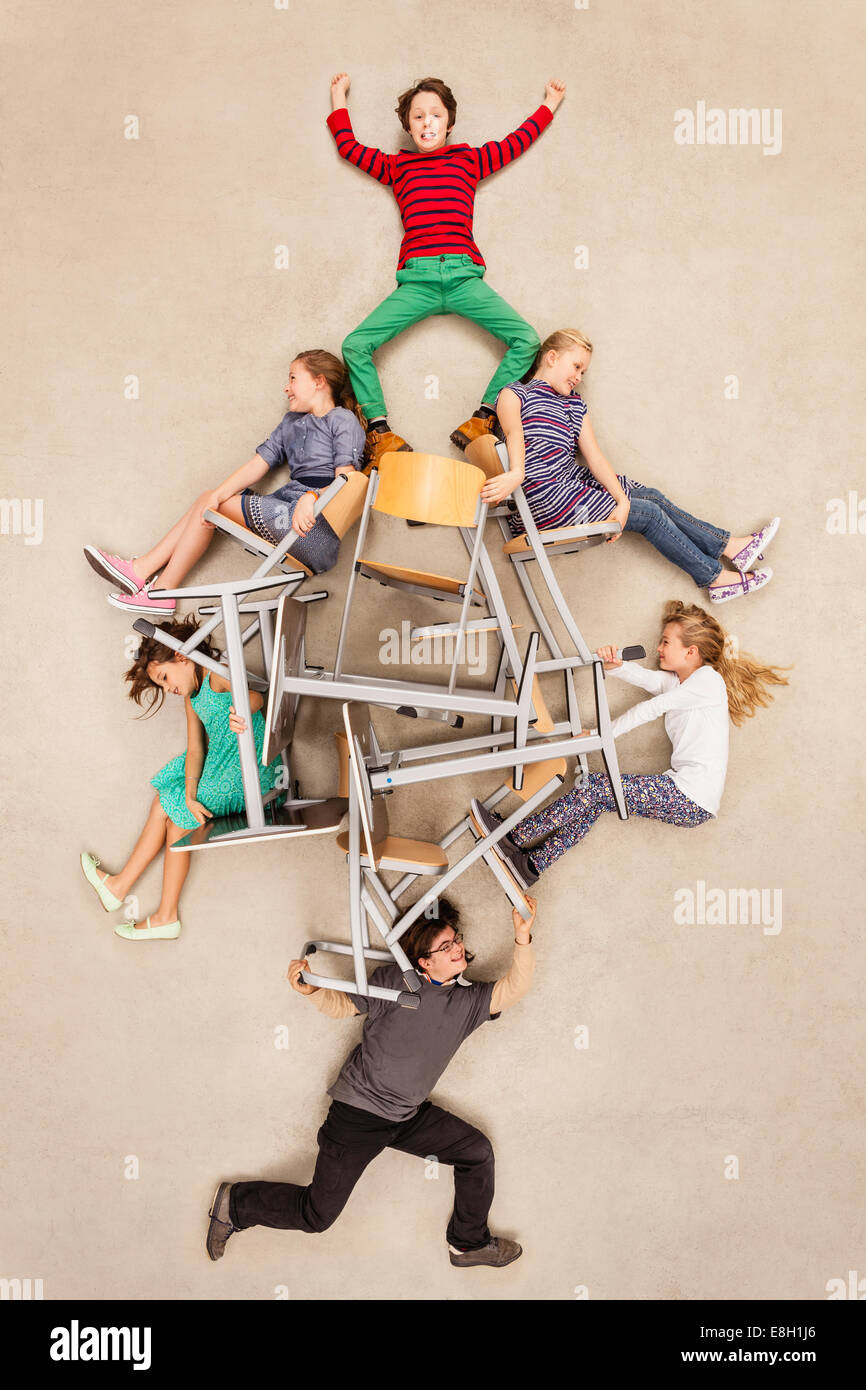 Girl Carrying Chair Stock Photos & Girl Carrying Chair Stock Images - Alamy