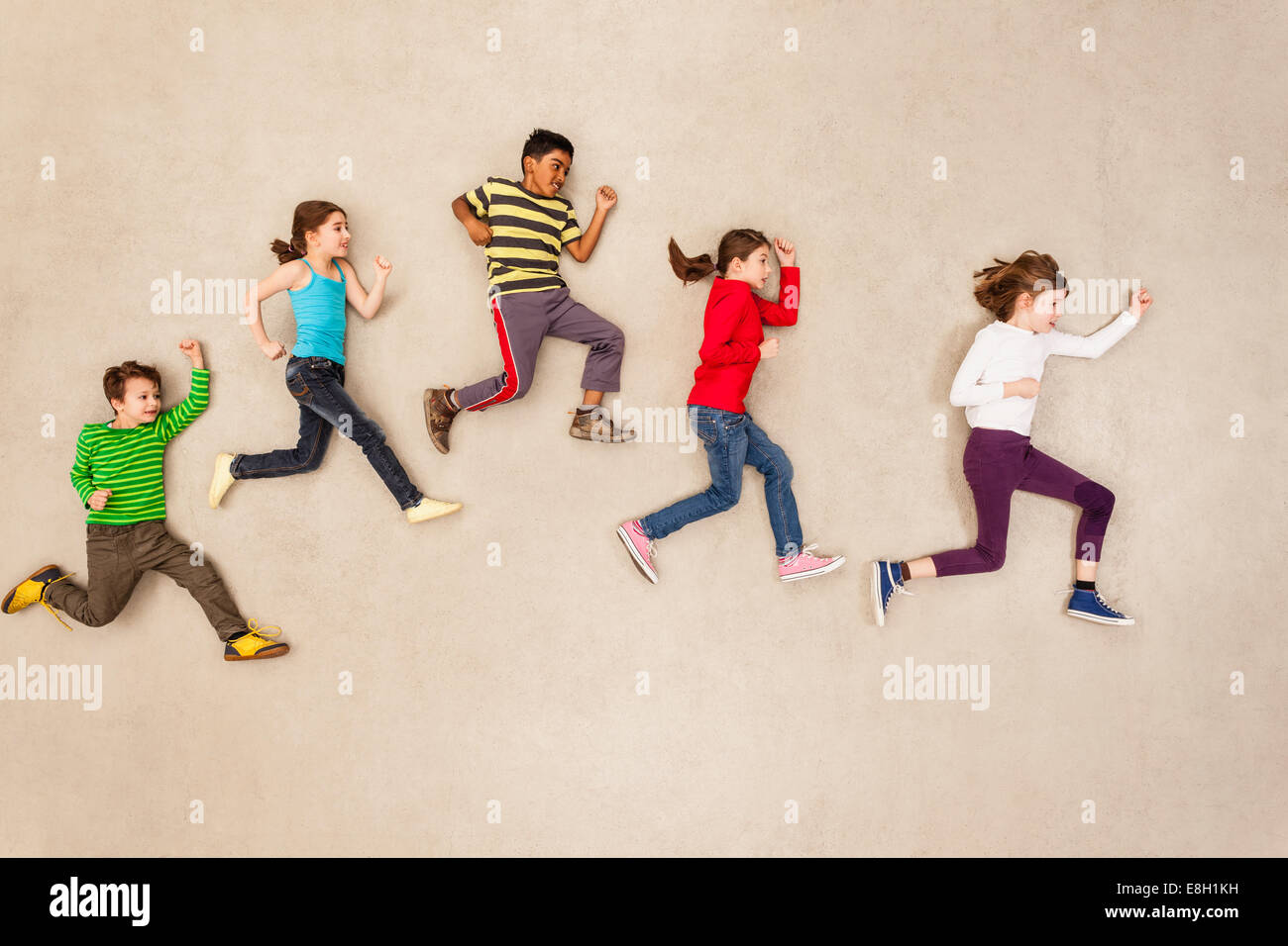 Group of people running overhead hi-res stock photography and images ...