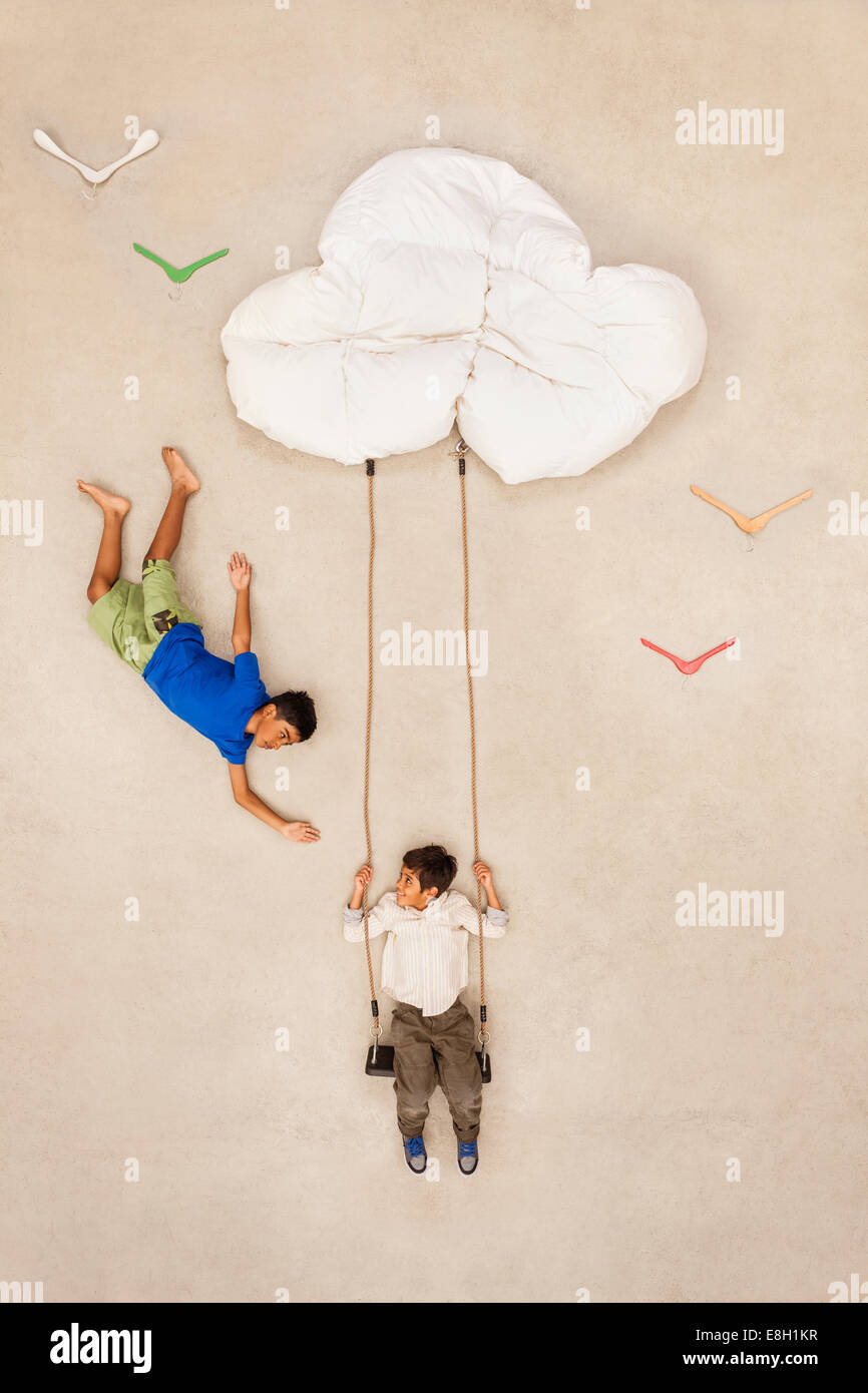 Child on clouds hi-res stock photography and images - Alamy