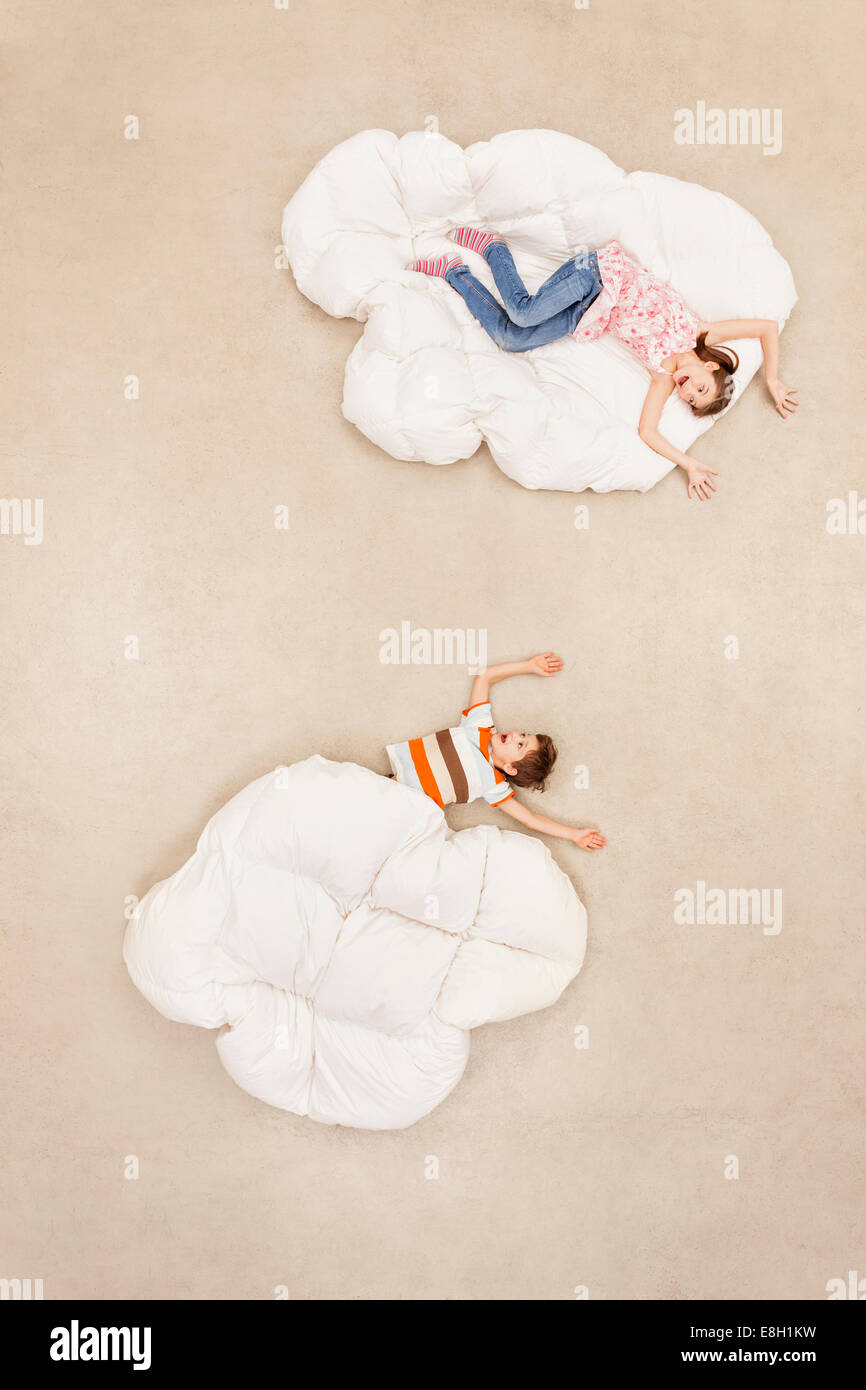 Child in clouds hi-res stock photography and images - Alamy