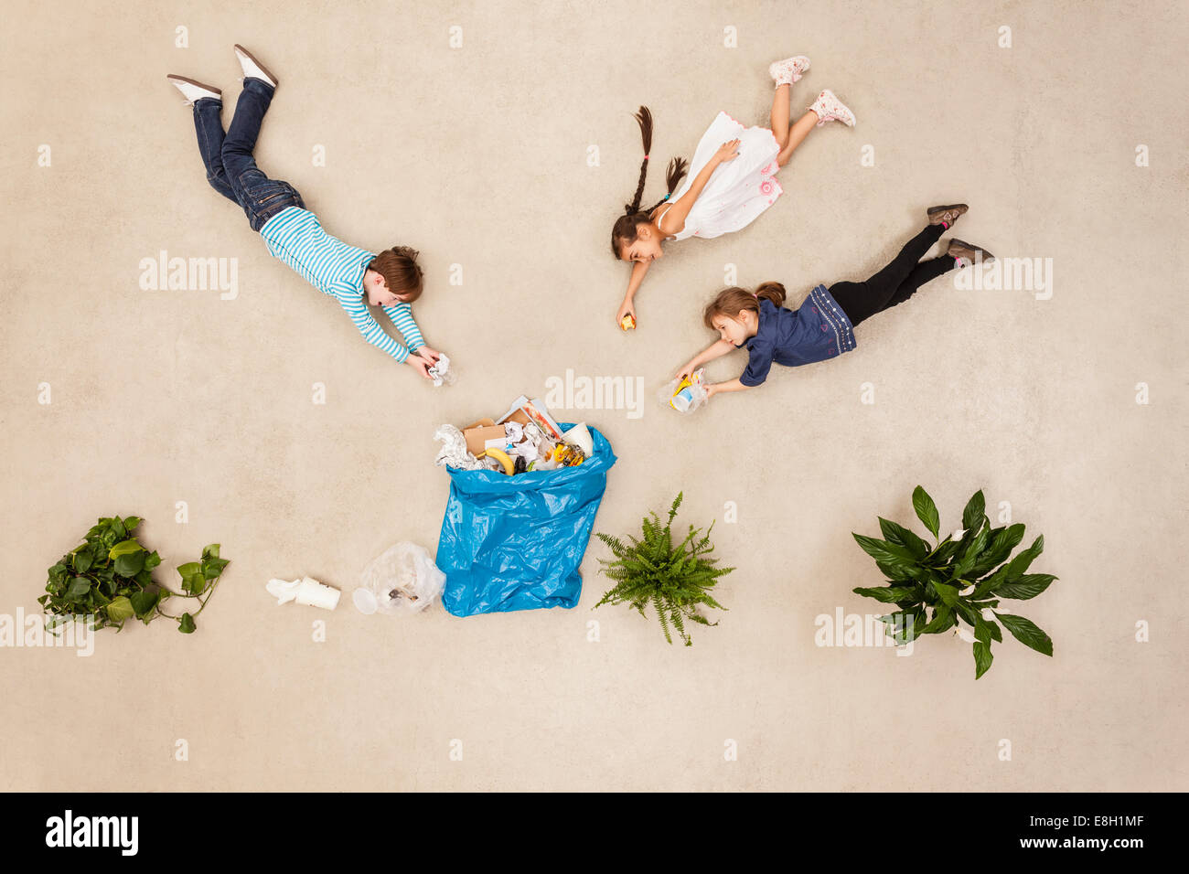 Children collecting garbage in nature Stock Photo - Alamy