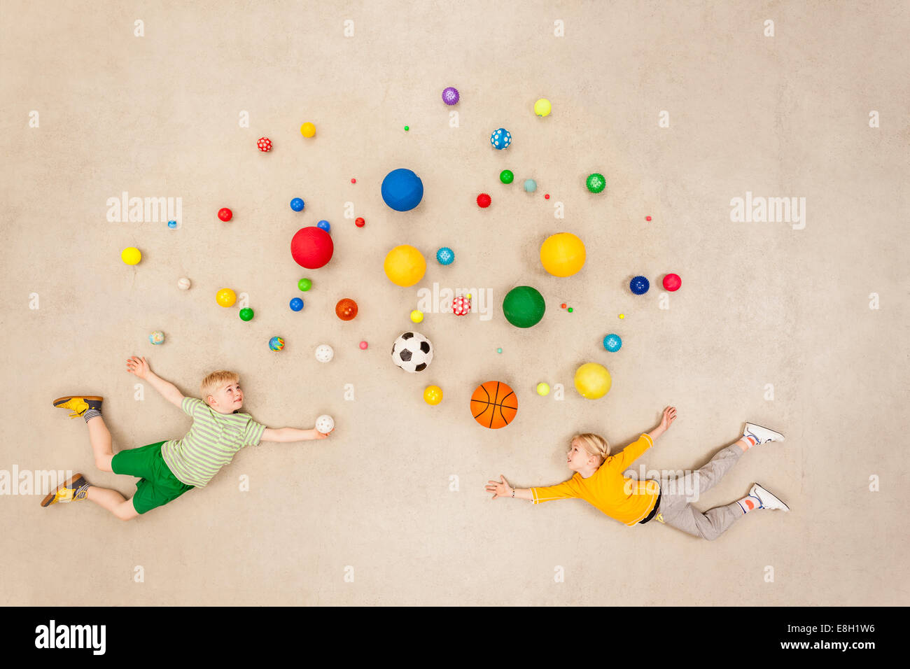 Children with colorful balls Stock Photo - Alamy
