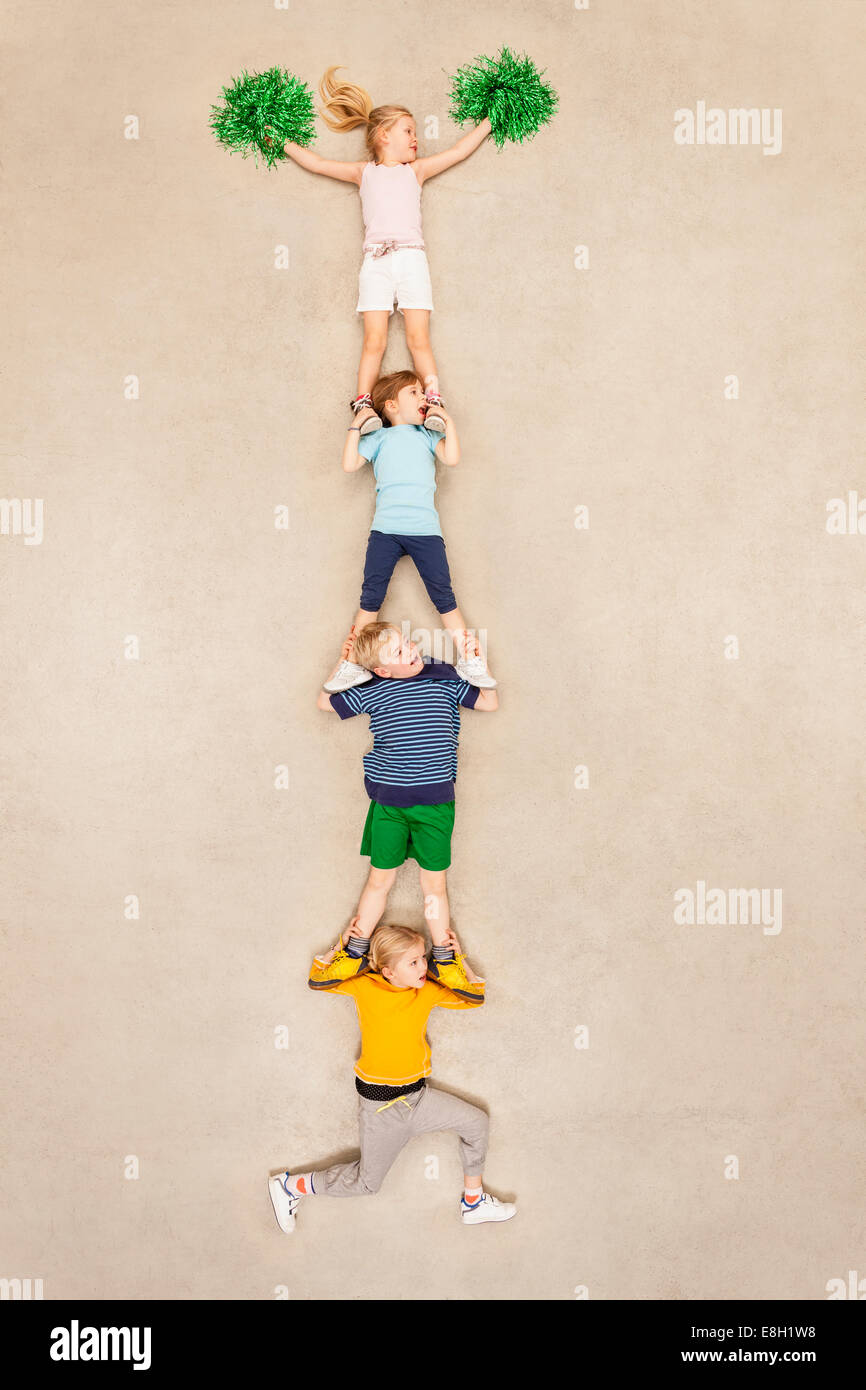 Girl carrying friends and cheerleader Stock Photo - Alamy