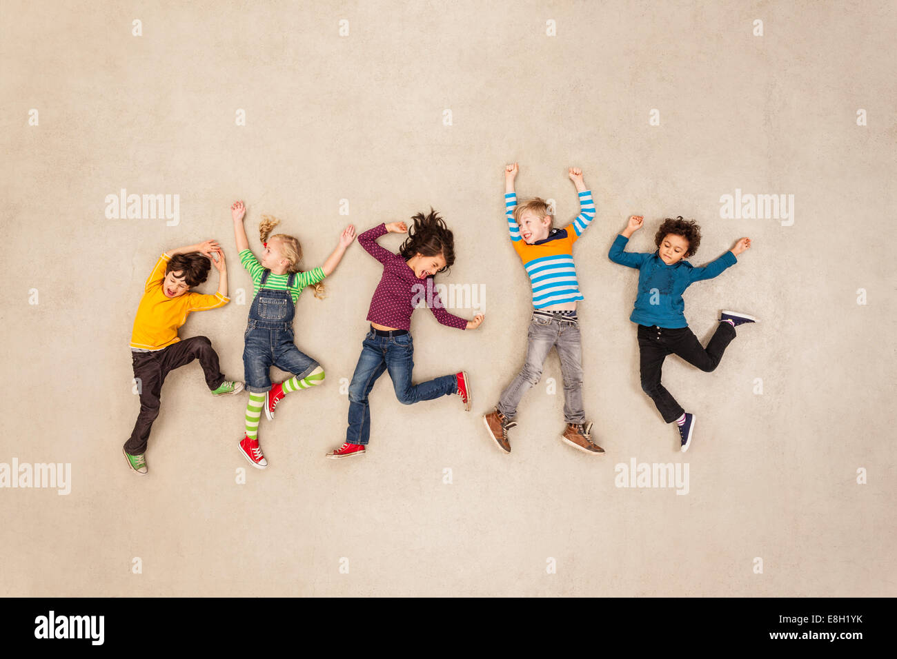 Children messing around happily Stock Photo - Alamy