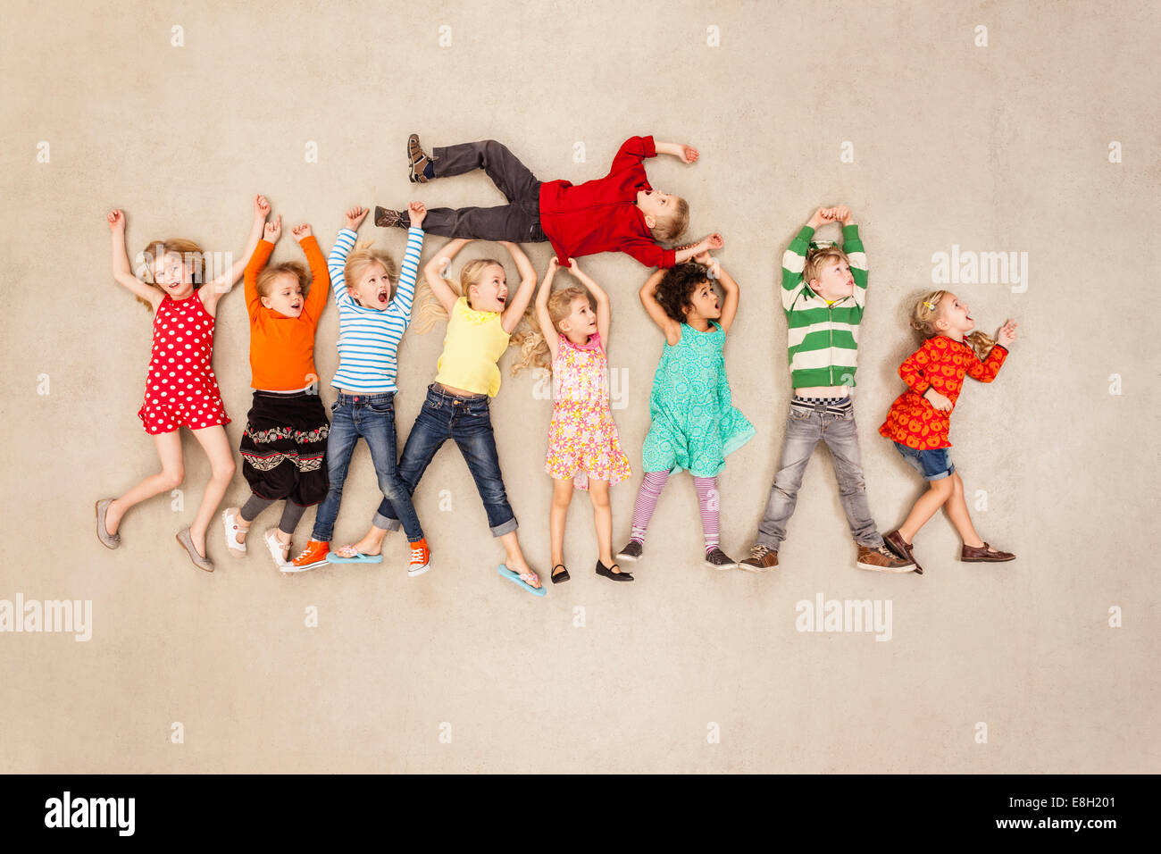 Children messing around happily Stock Photo - Alamy