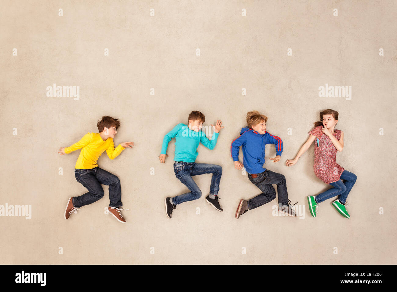 Children tiptoeing secretly Stock Photo - Alamy