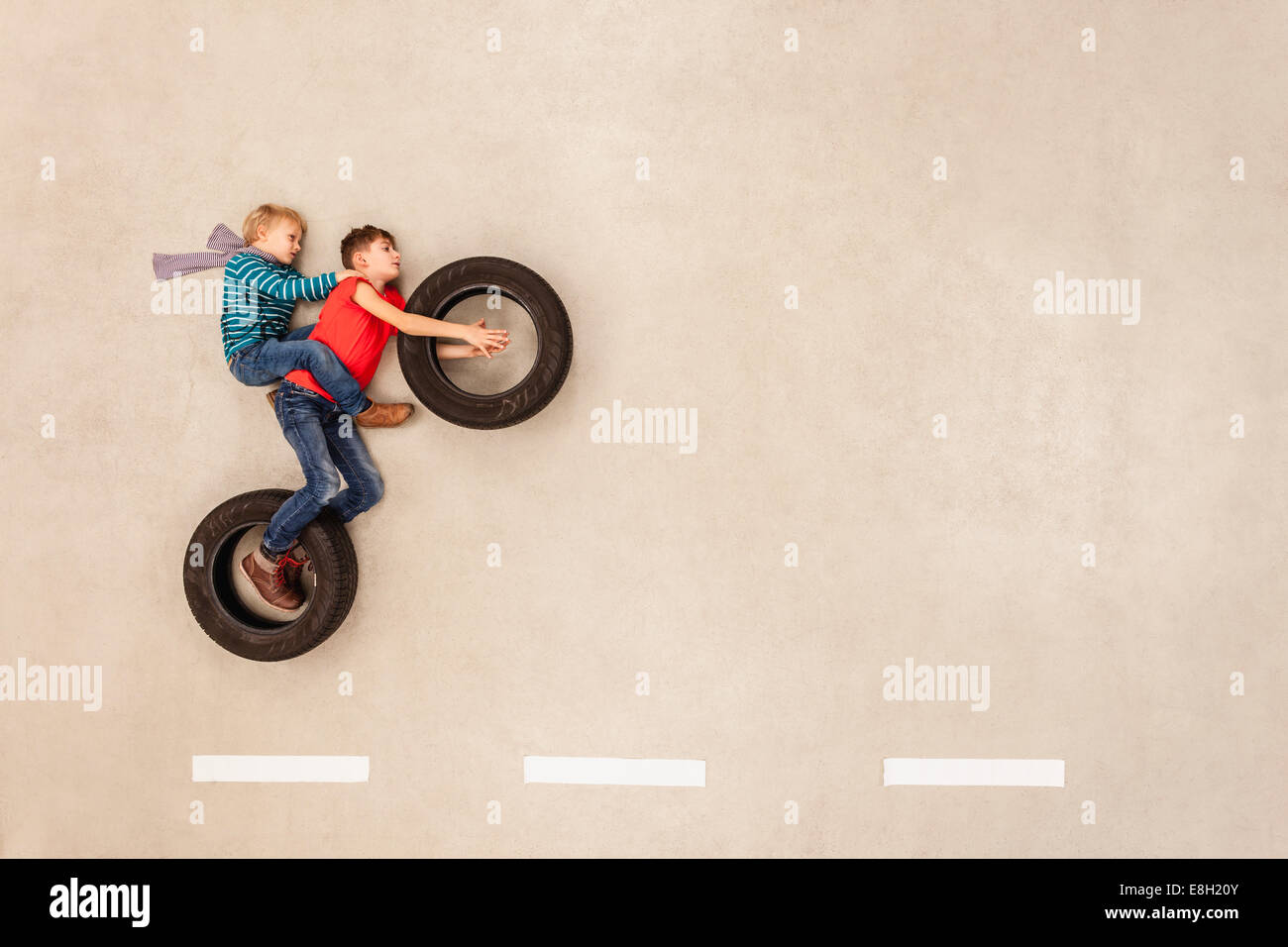 Bikers pulling a wheelie Stock Photo - Alamy