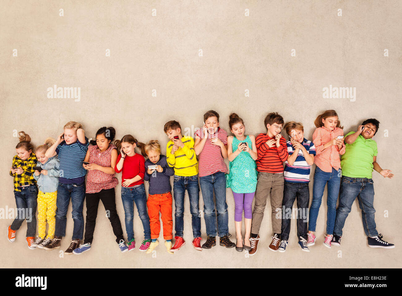 Children using mobile phones Stock Photo - Alamy