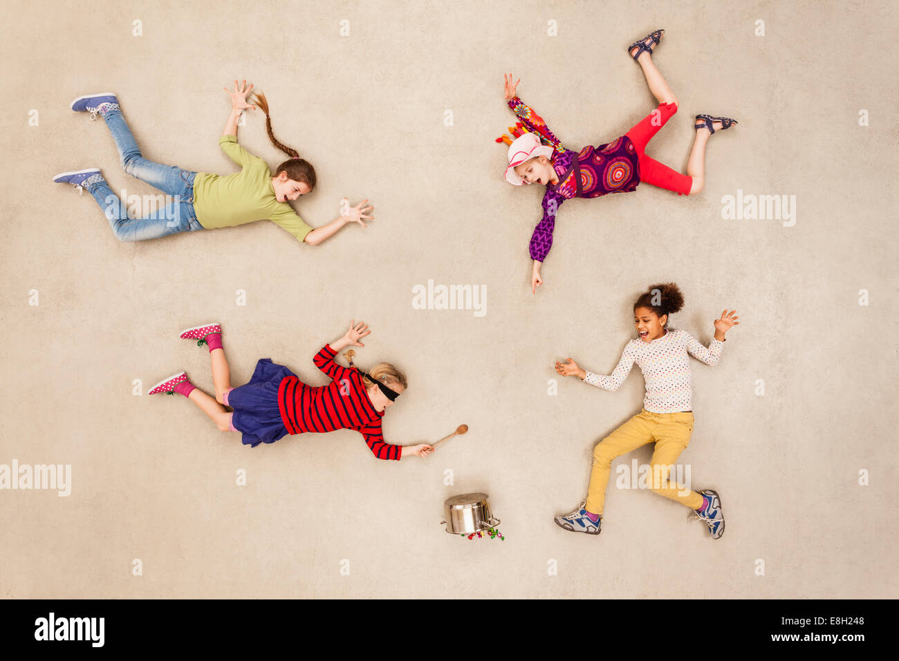 Children playing Hit the Pot Stock Photo - Alamy