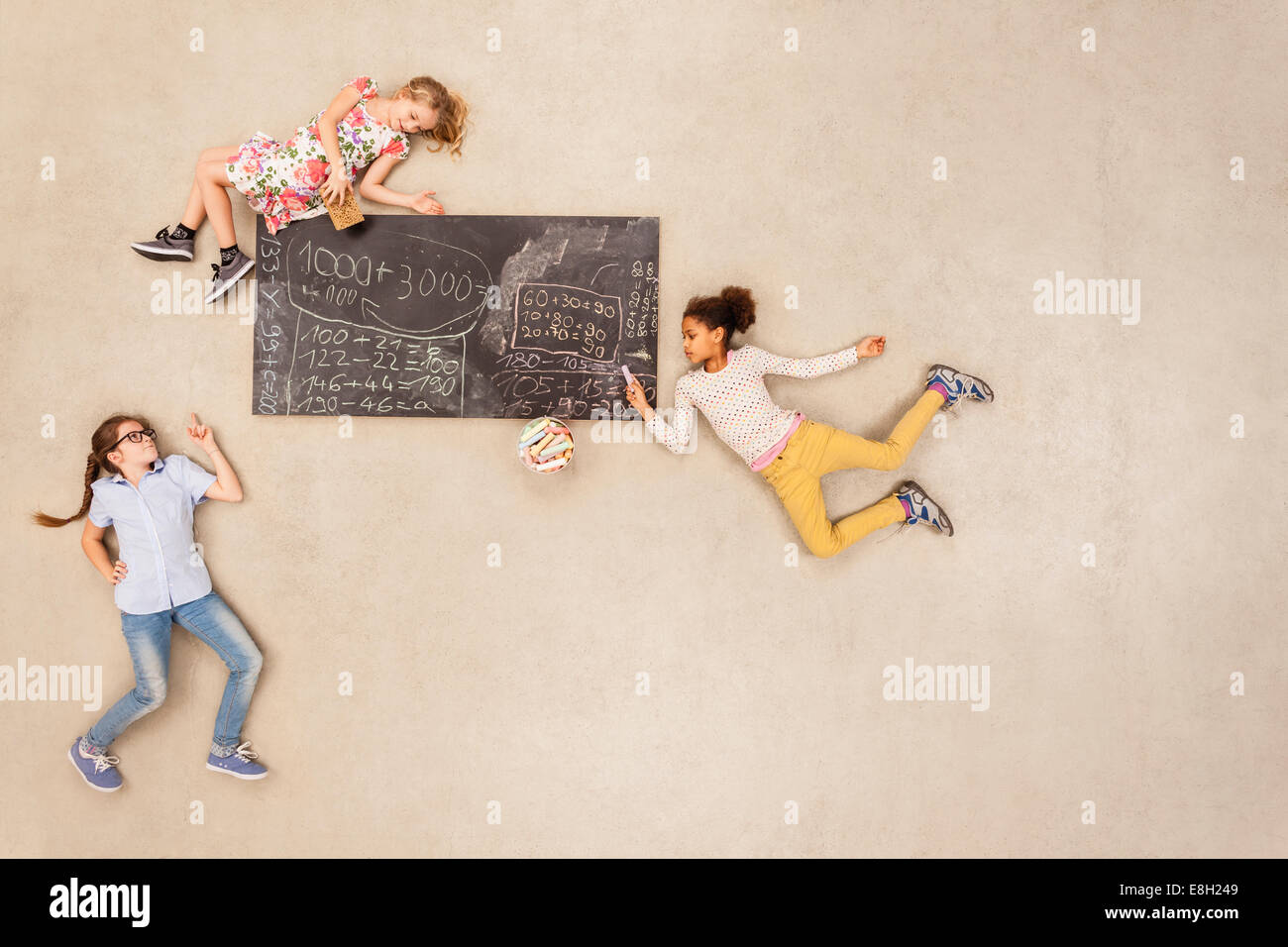 School kids calculating on blackboard Stock Photo - Alamy